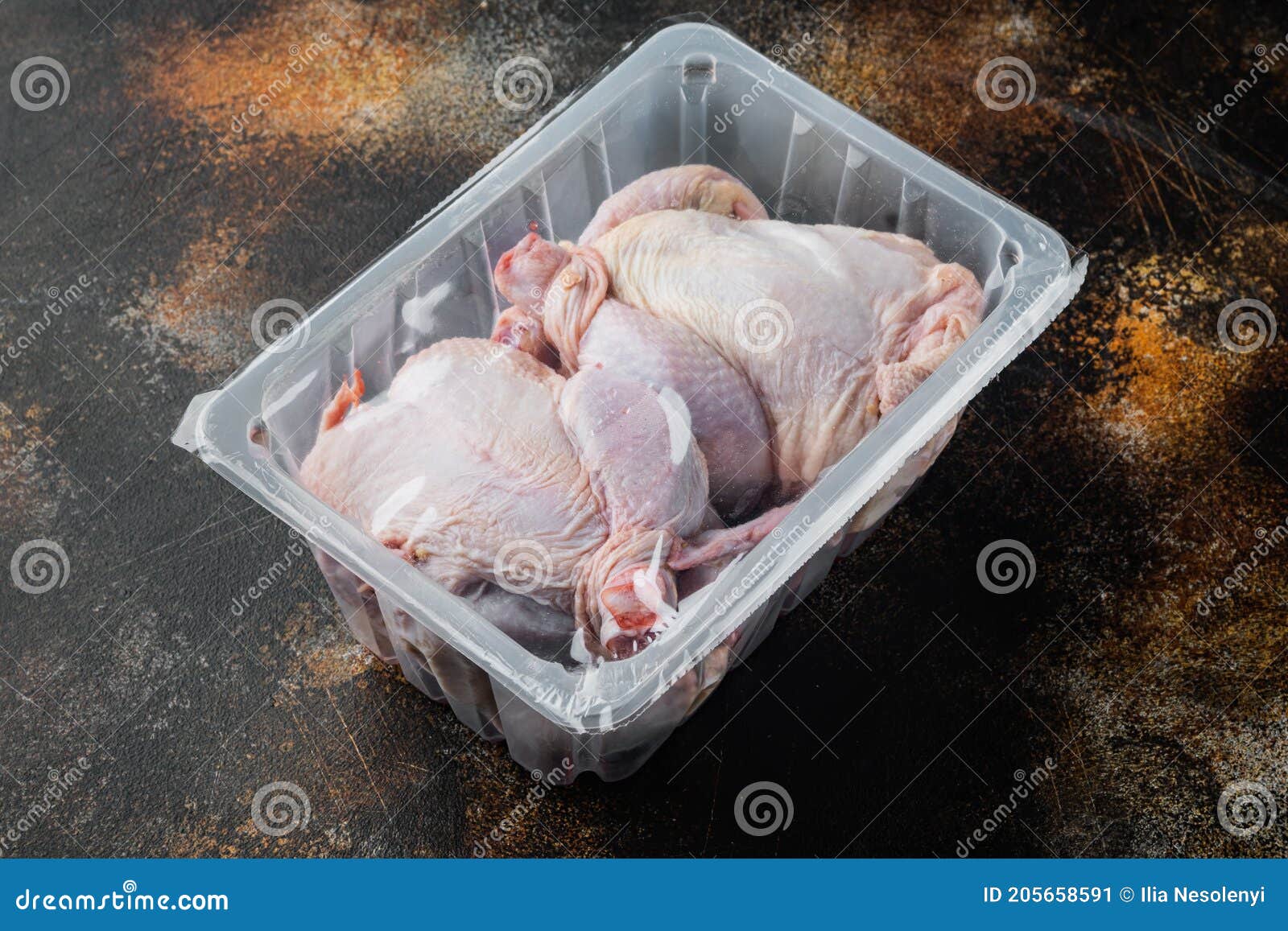 Raw Chicken in Plastic Vacuum Tray, on Old Rustic Background Stock ...