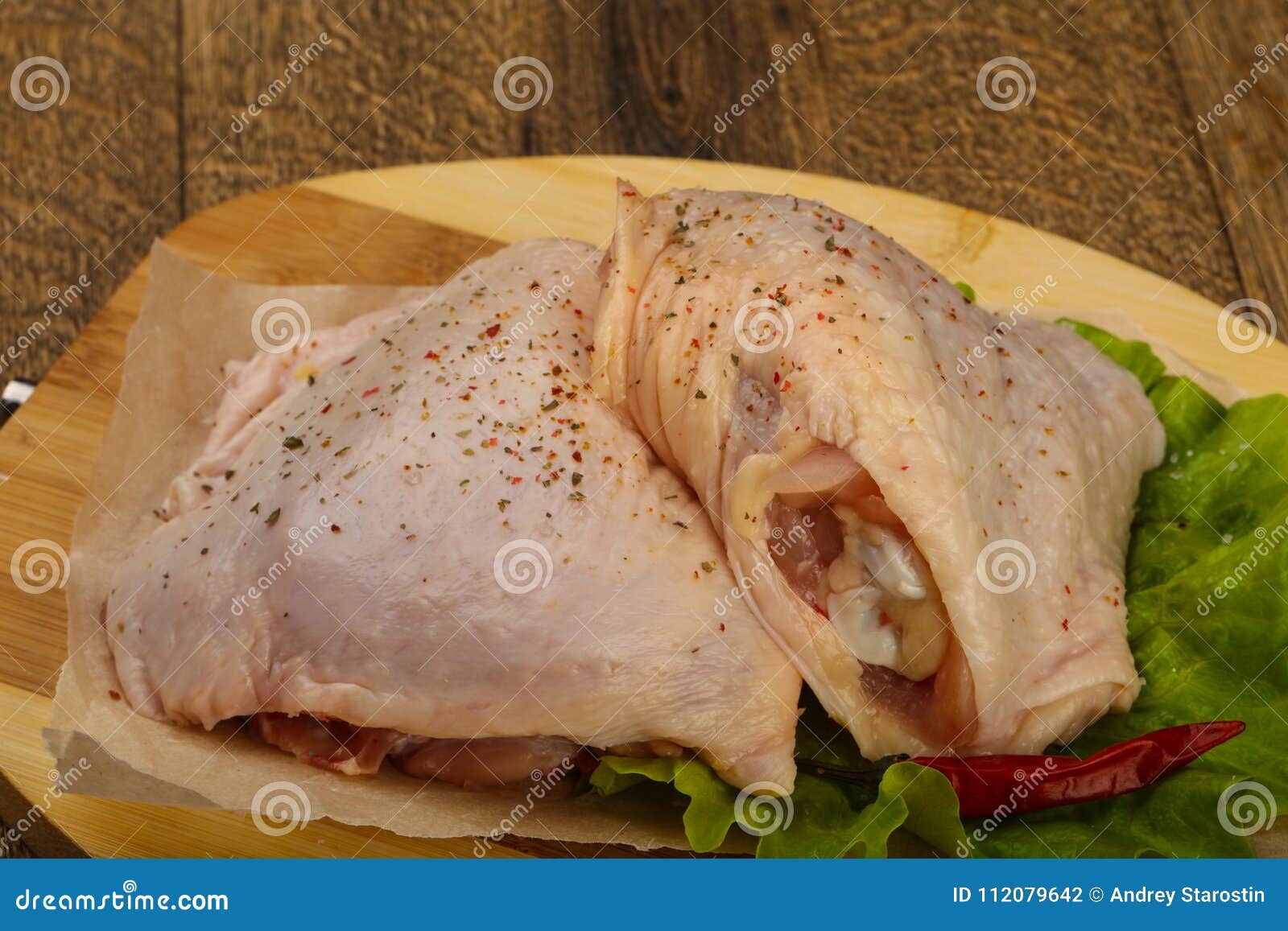 Raw chicken thigh stock photo. Image of wooden, butcher - 112079642