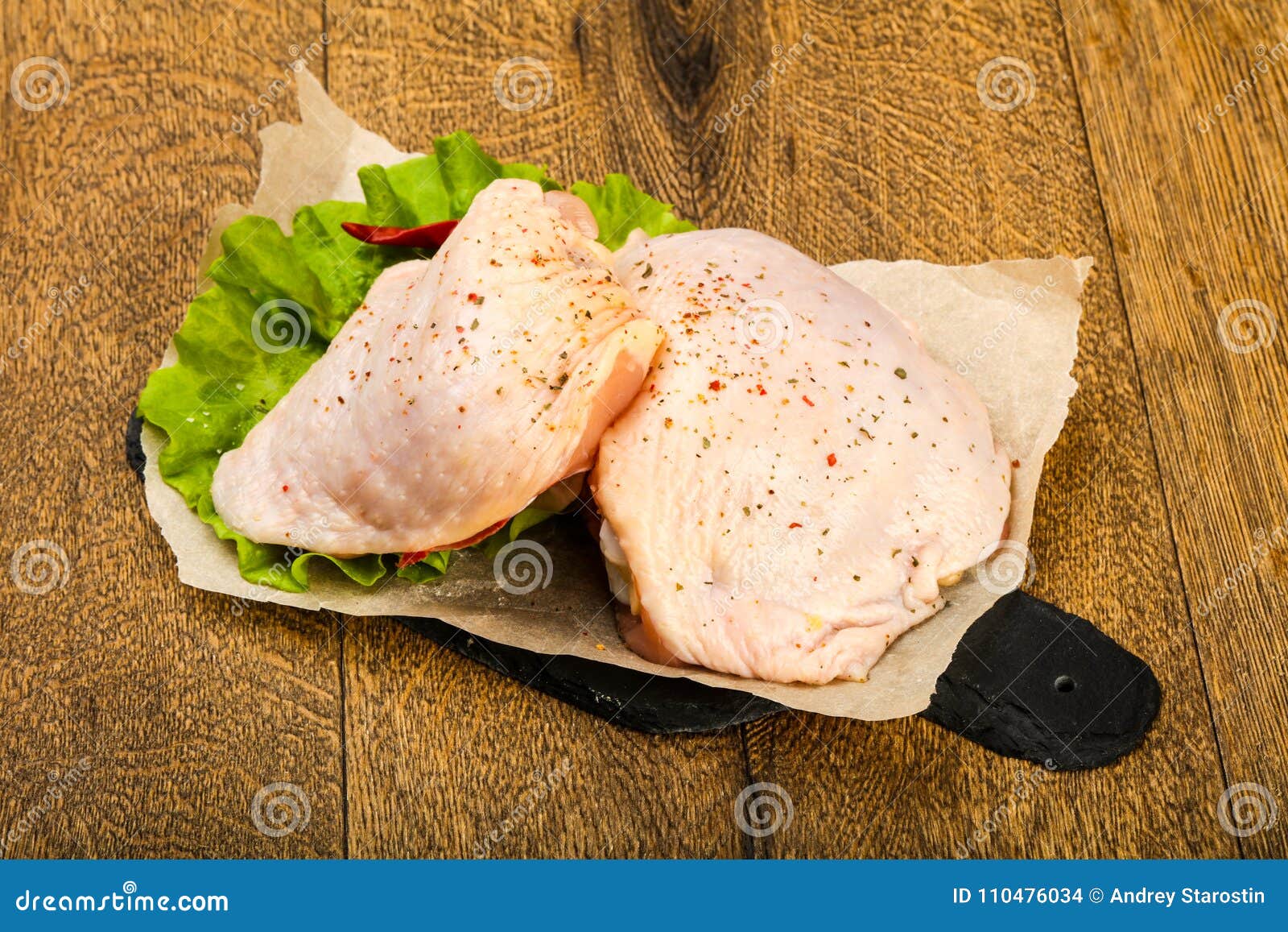Raw chicken thigh stock photo. Image of uncooked, meal - 110476034