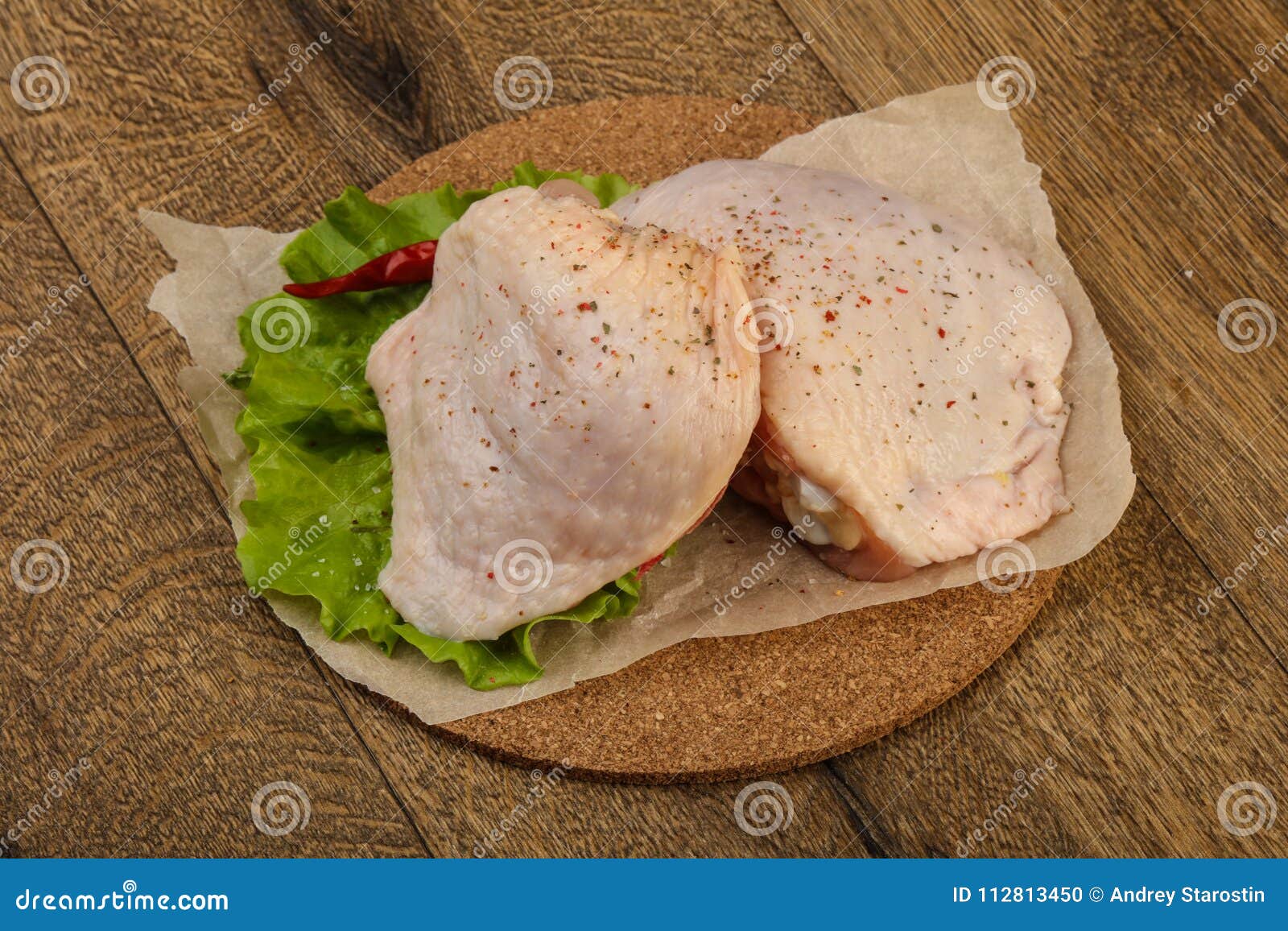 Raw chicken thigh stock photo. Image of drumstick, thighs - 112813450