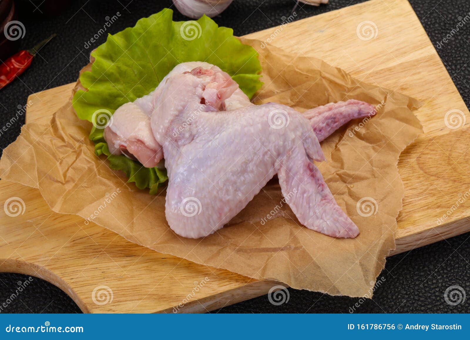 Raw chicken wings stock photo. Image of isolated, bone - 161786756