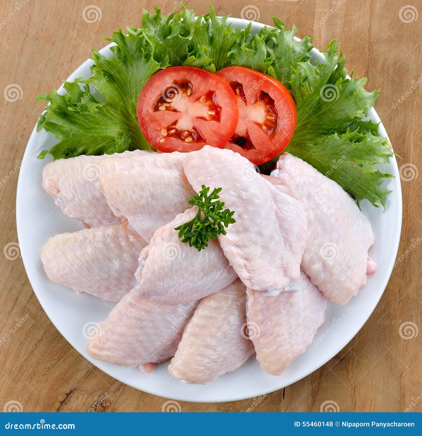 Raw Chicken Wings with Vegetables Stock Photo - Image of board ...