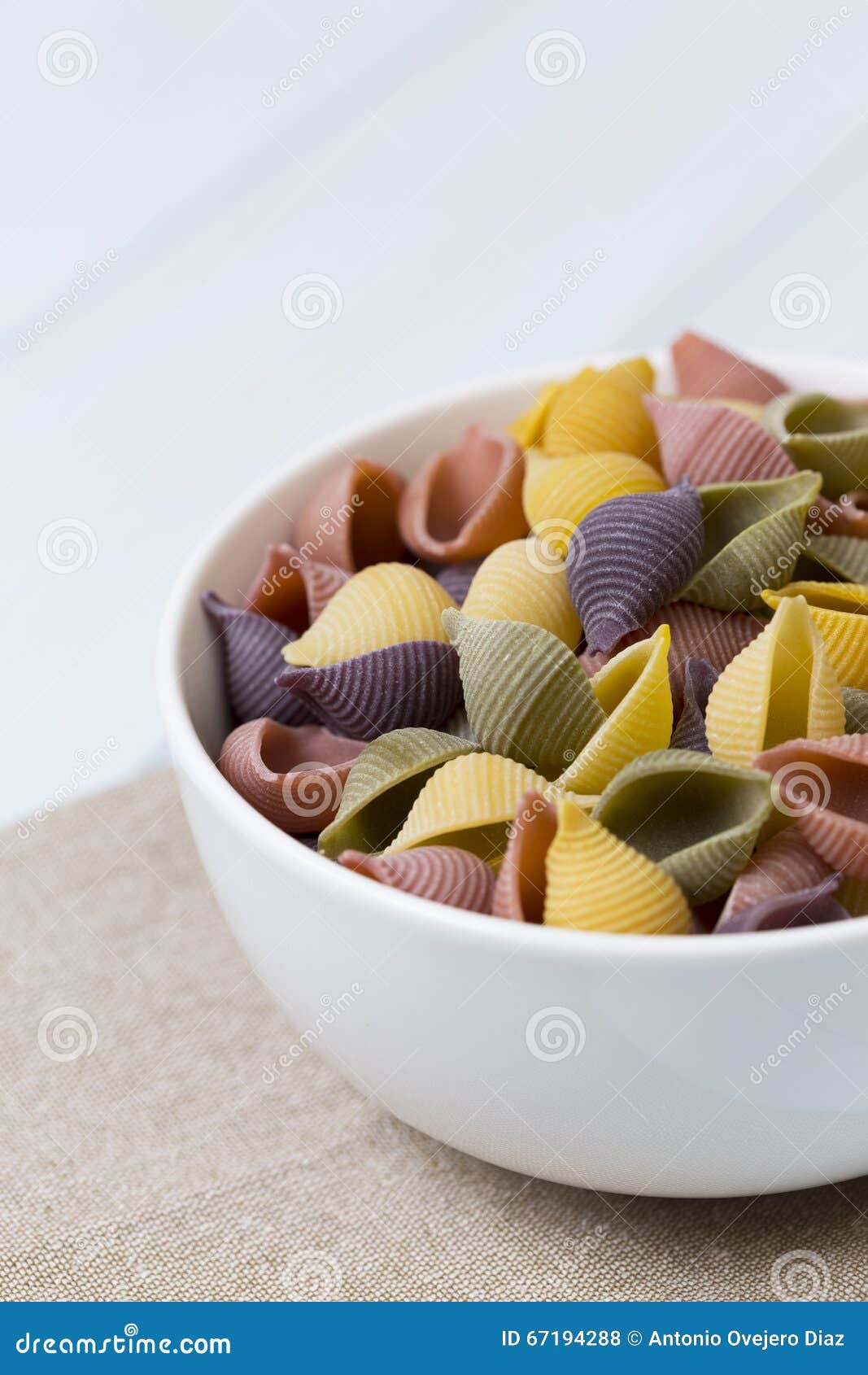Raw Cocciolette Pasta in a White Bowl Stock Photo - Image of healthy ...