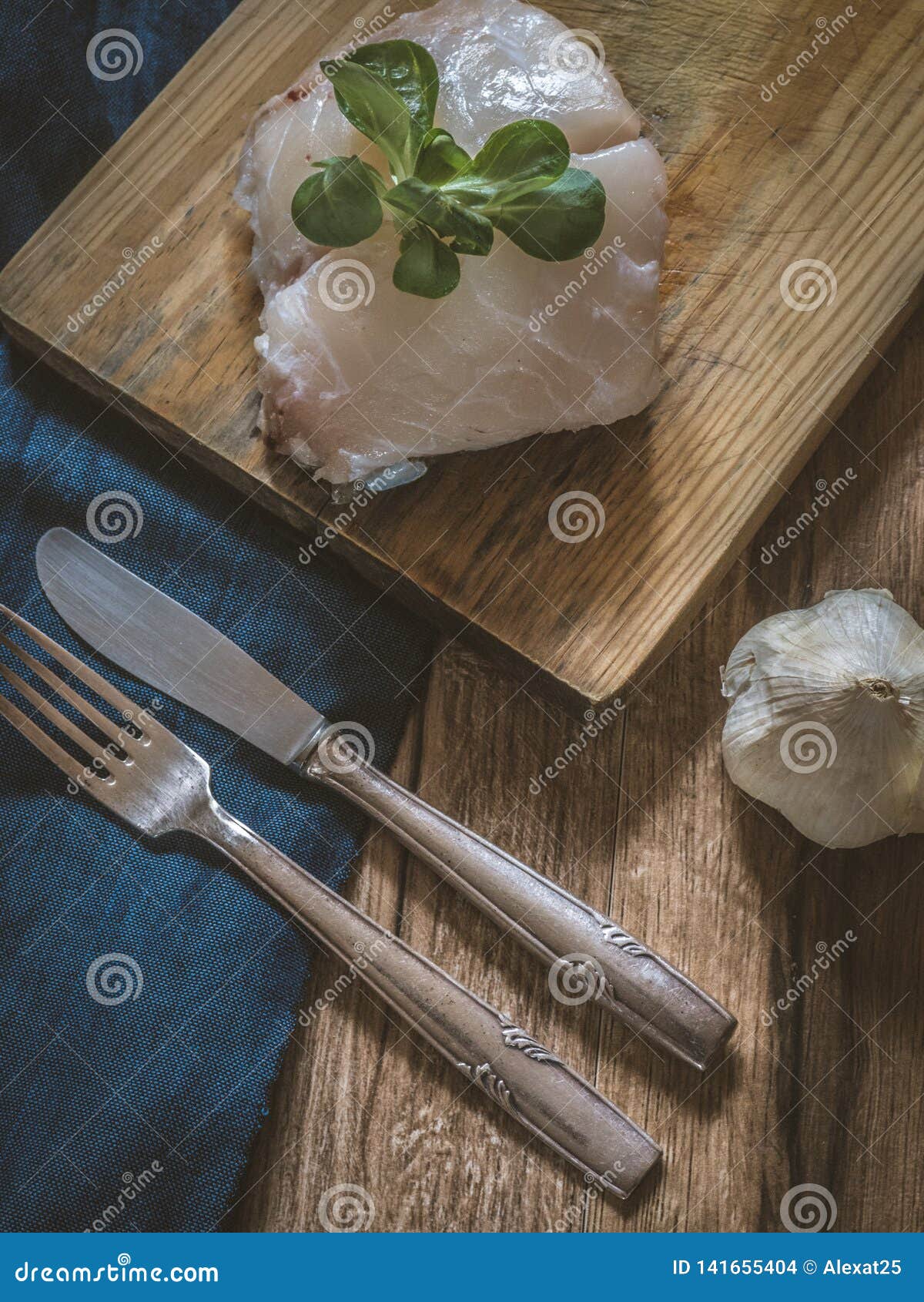 Raw cod stock photo. Image of garlic, grilled, plate - 141655404