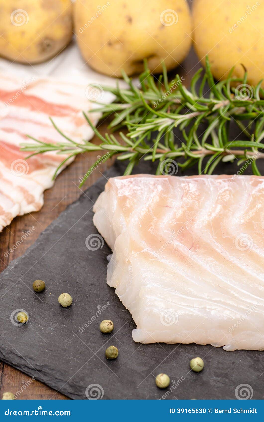 Raw cod in vertical format stock photo. Image of belly - 39165630