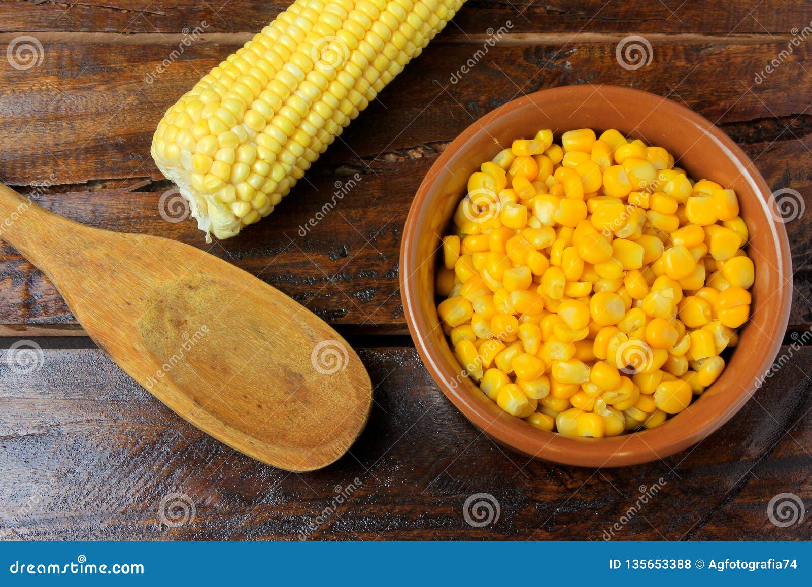 Raw Corn Kernels, Inside Ceramic Bowl, Next To Wooden Spoon on Rustic ...