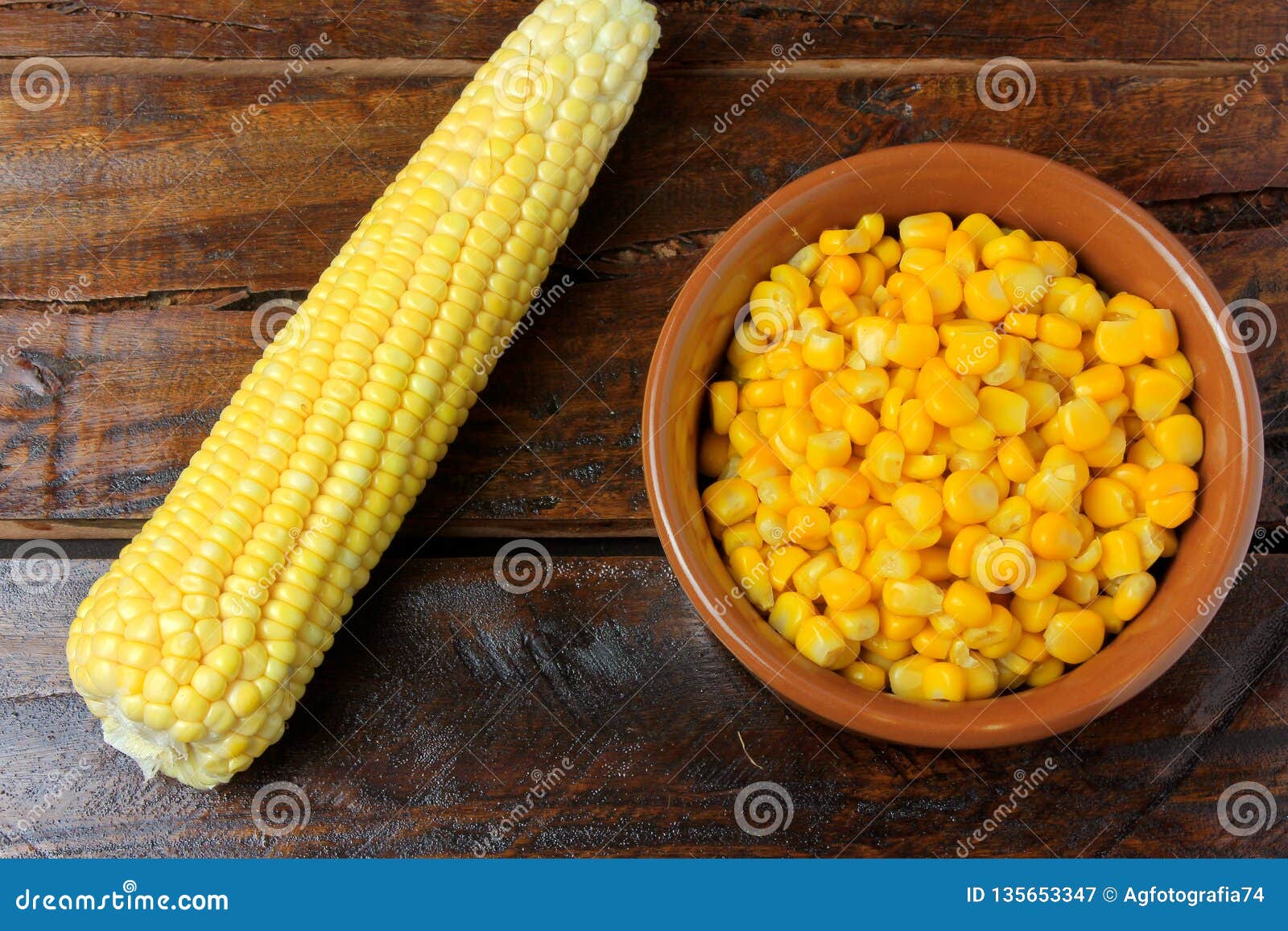 Raw Corn Kernels Inside Ceramic Bowl on Rustic Wooden Table. Space for ...