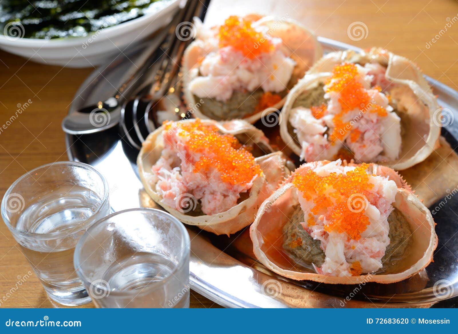 Raw Crab roe sashimi stock photo. Image of sake, glass - 72683620