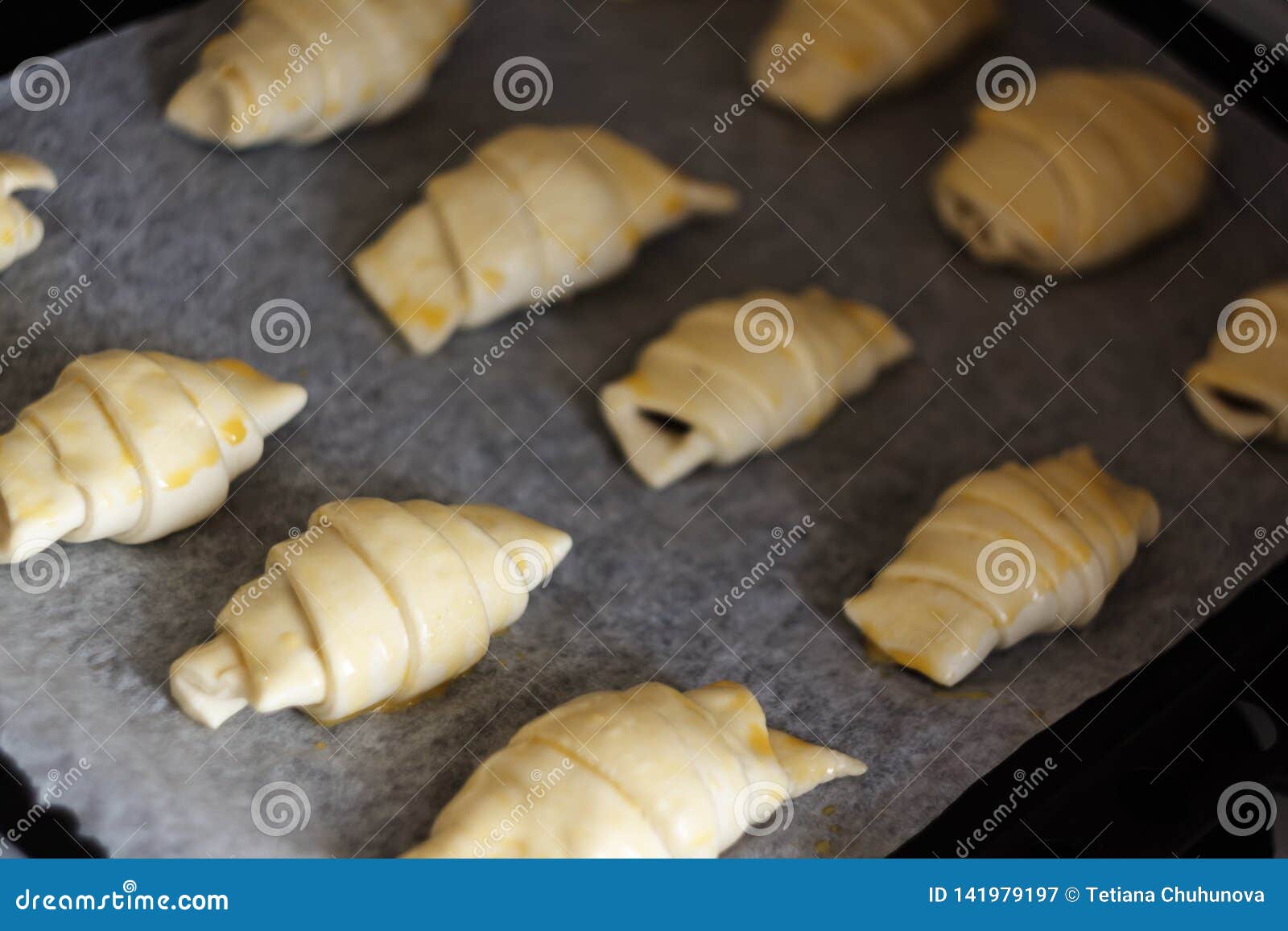 Raw Croissants with Chocolate on a Baking Sheet before Baking Stock ...