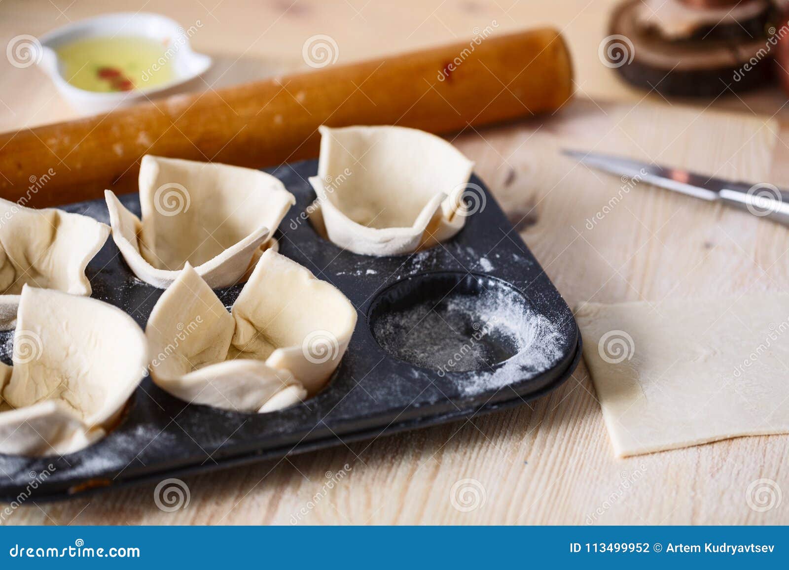 Raw dough in a baking dish stock photo. Image of meal - 113499952