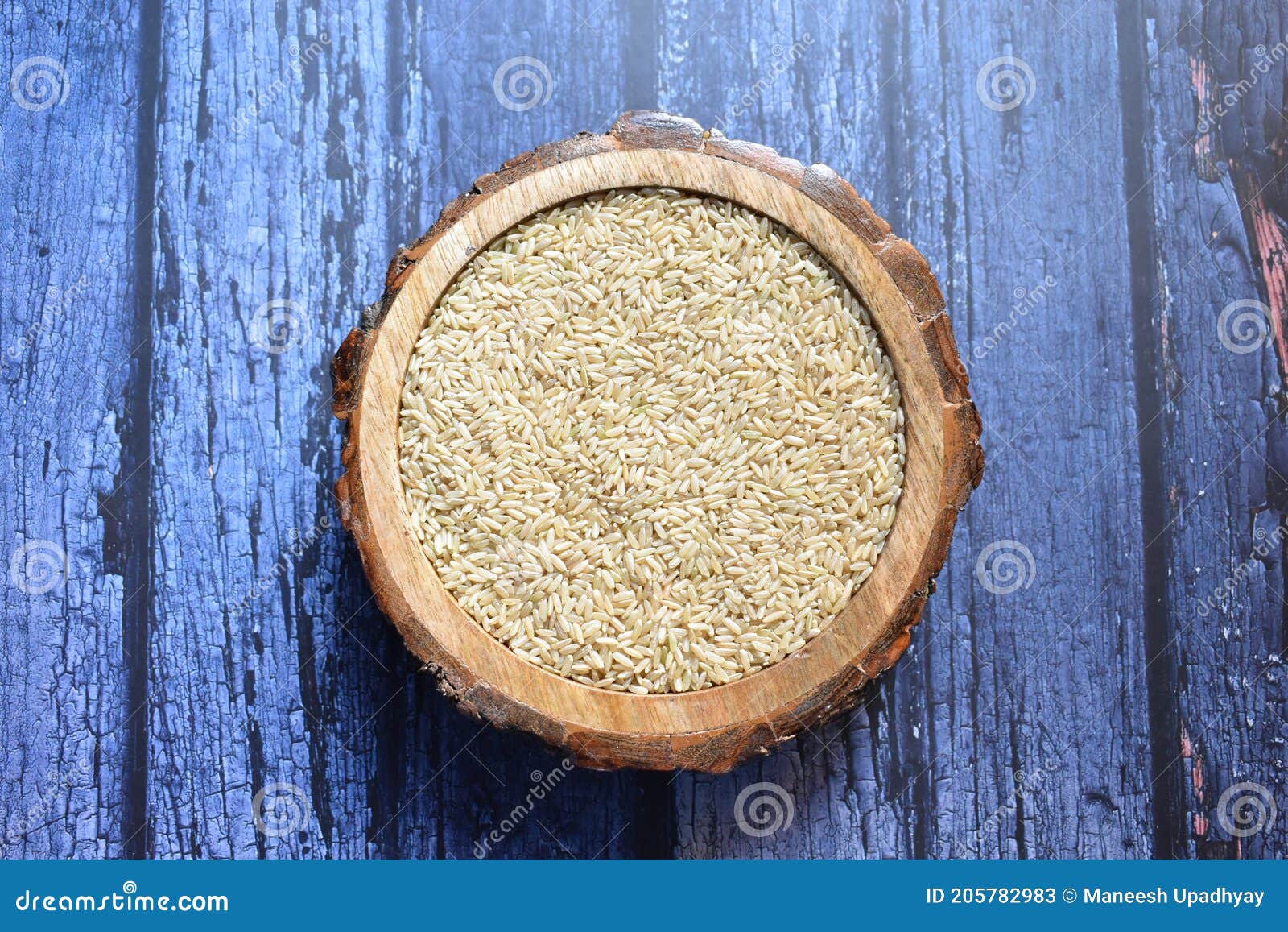 Raw dried brown color rice stock image. Image of healthy - 205782983