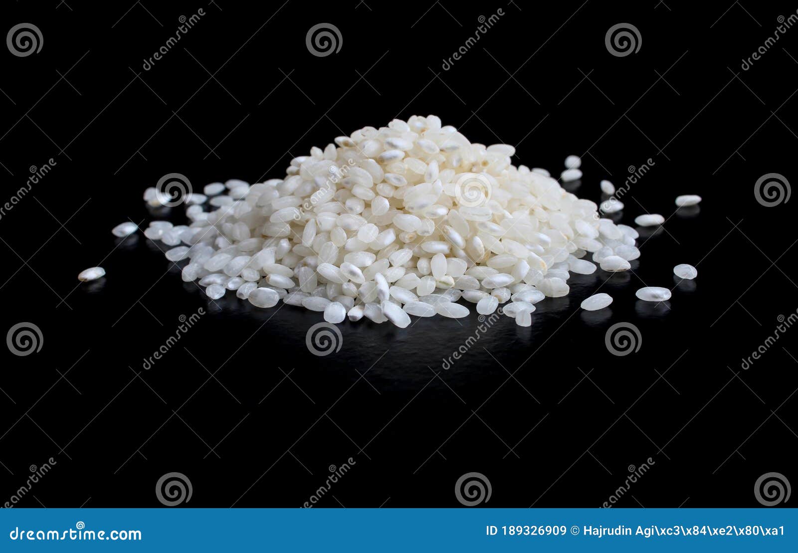 Raw and Dry White Rice Isolated on Black Background. Pile/heap Stock ...