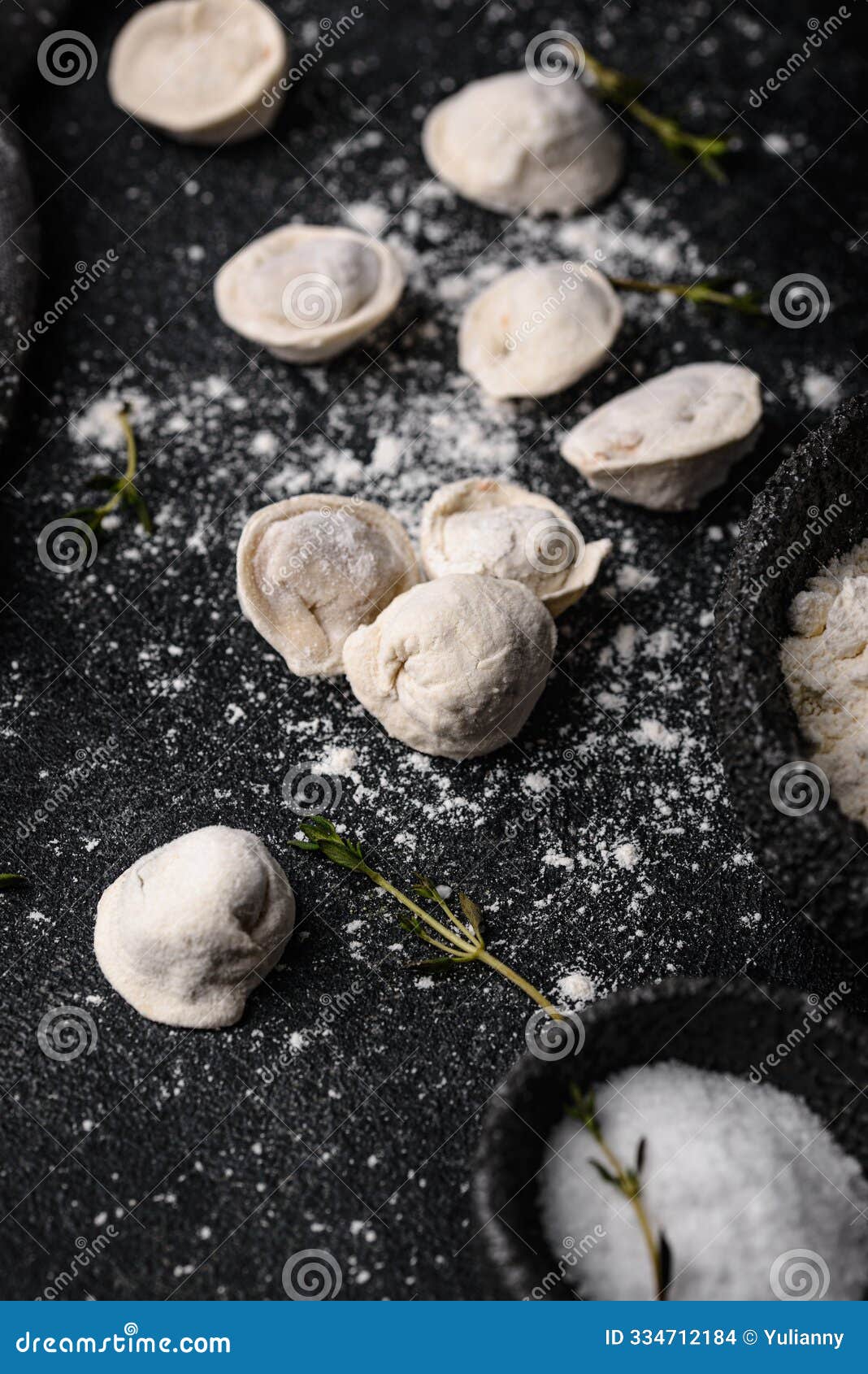 Raw Dumplings or Ravioli on Black Background Stock Photo - Image of ...