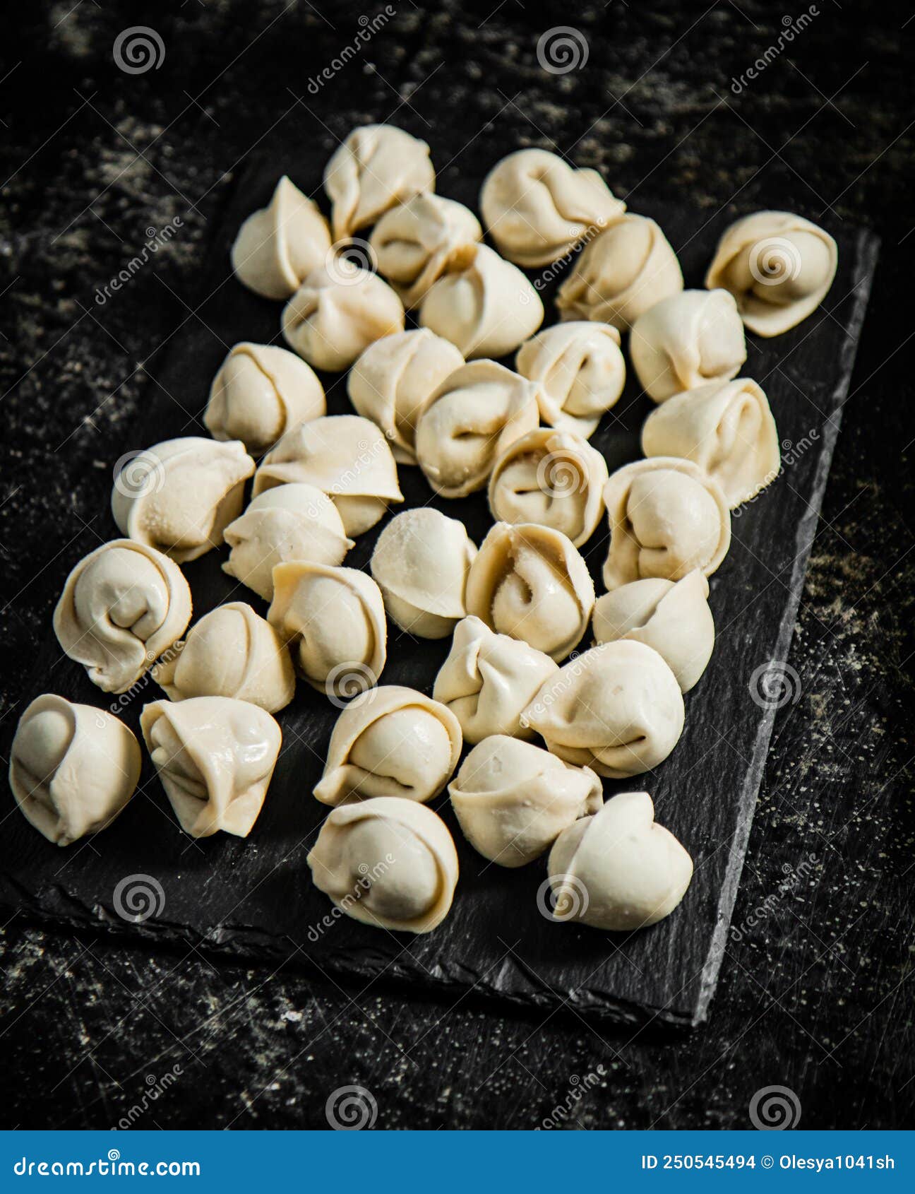 Raw Dumplings on a Stone Board. Stock Photo - Image of ingredient ...