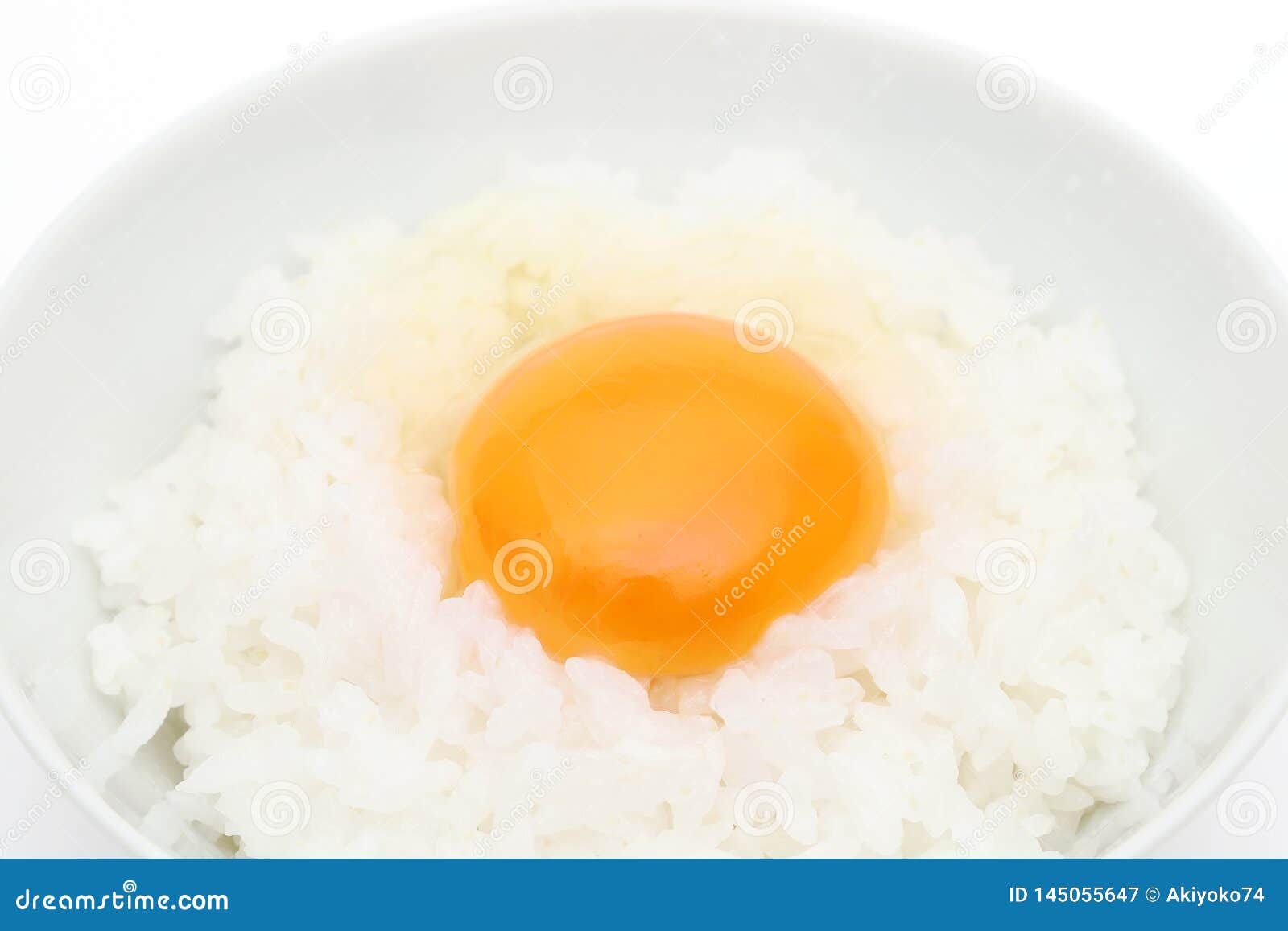 Raw egg on rice stock image. Image of breakfast, healthy - 145055647