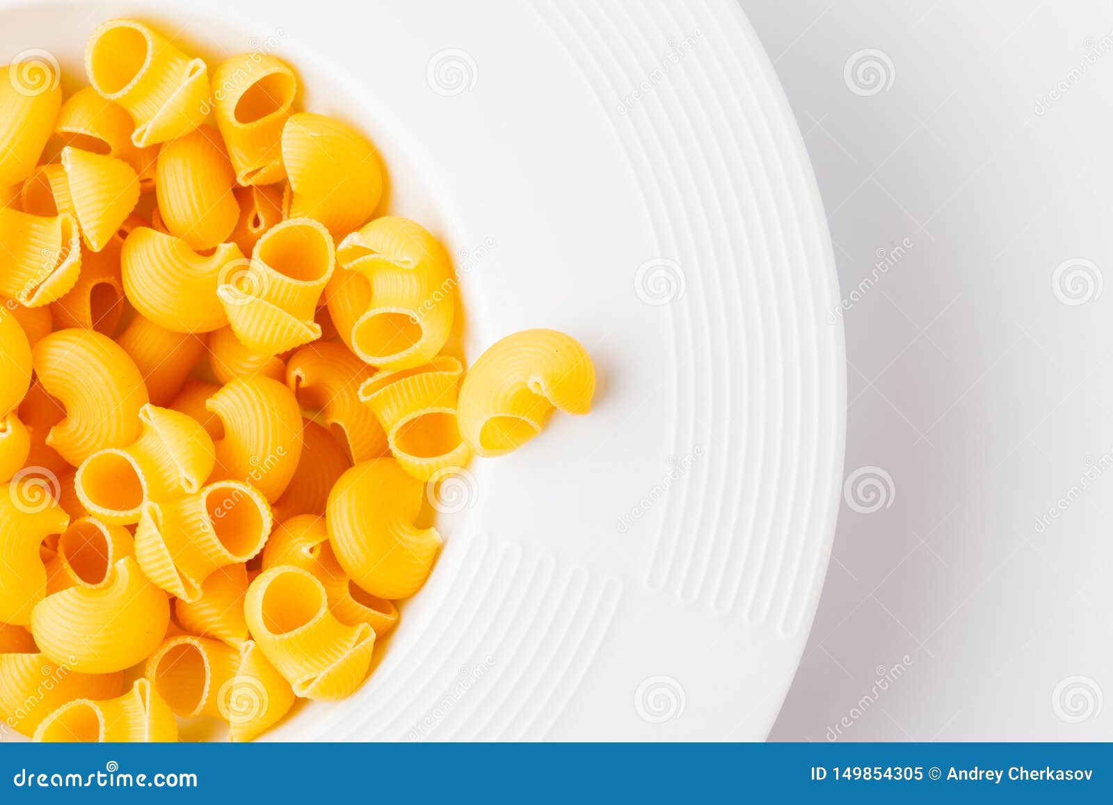 Raw Elbow Macaroni Gomiti Pasta in Bowl Stock Image - Image of gomiti ...