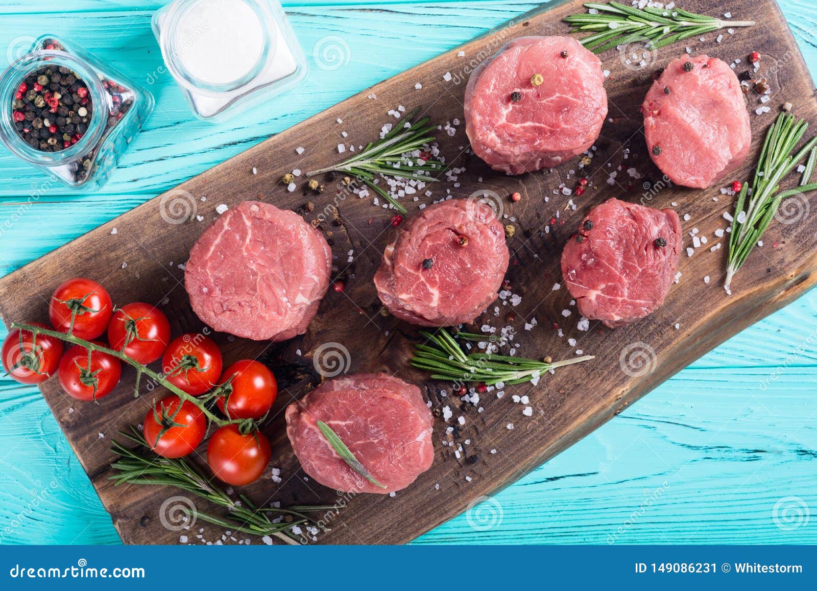 Raw filet mignon stock image. Image of herb, board, salt - 149086231