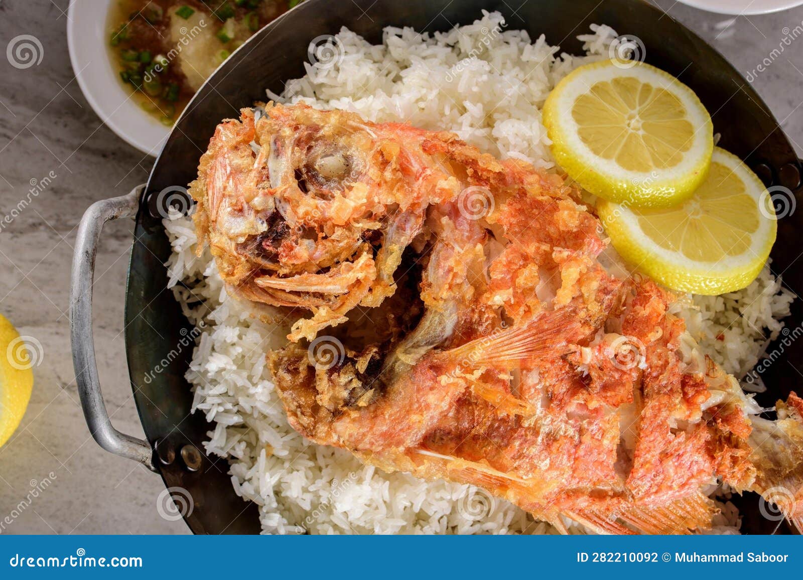 Deliciously Crispy: Top Close-Up of Deep Fried Red Snapper Fish Over ...