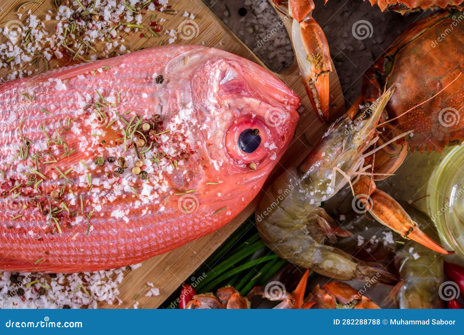 Vibrant Close-Up: Fresh Raw Red Snapper Fish with Zesty Lemon Accent in ...