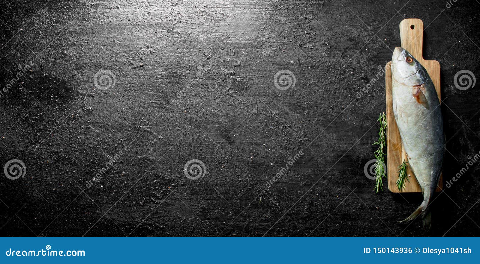 Raw Fish on a Cutting Board with Rosemary Stock Photo - Image of ...