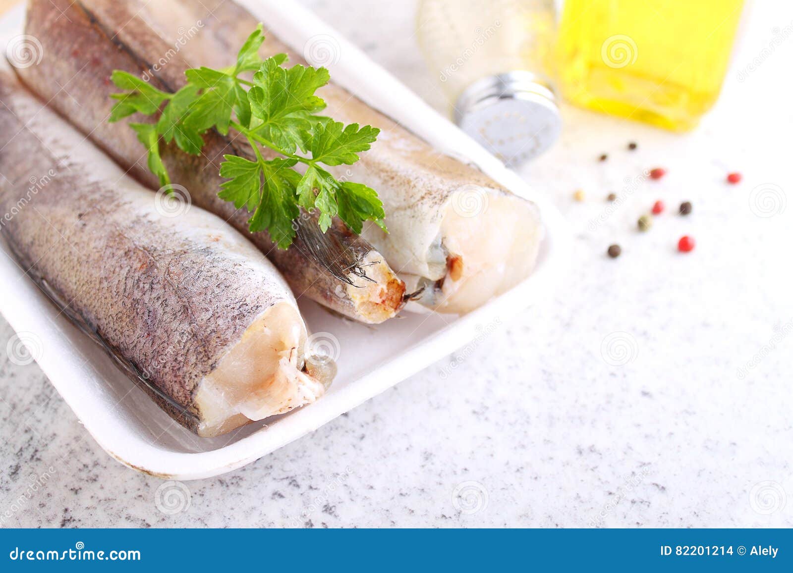 Raw Fish Hake in White Packaging Decorated Stock Photo - Image of hake ...