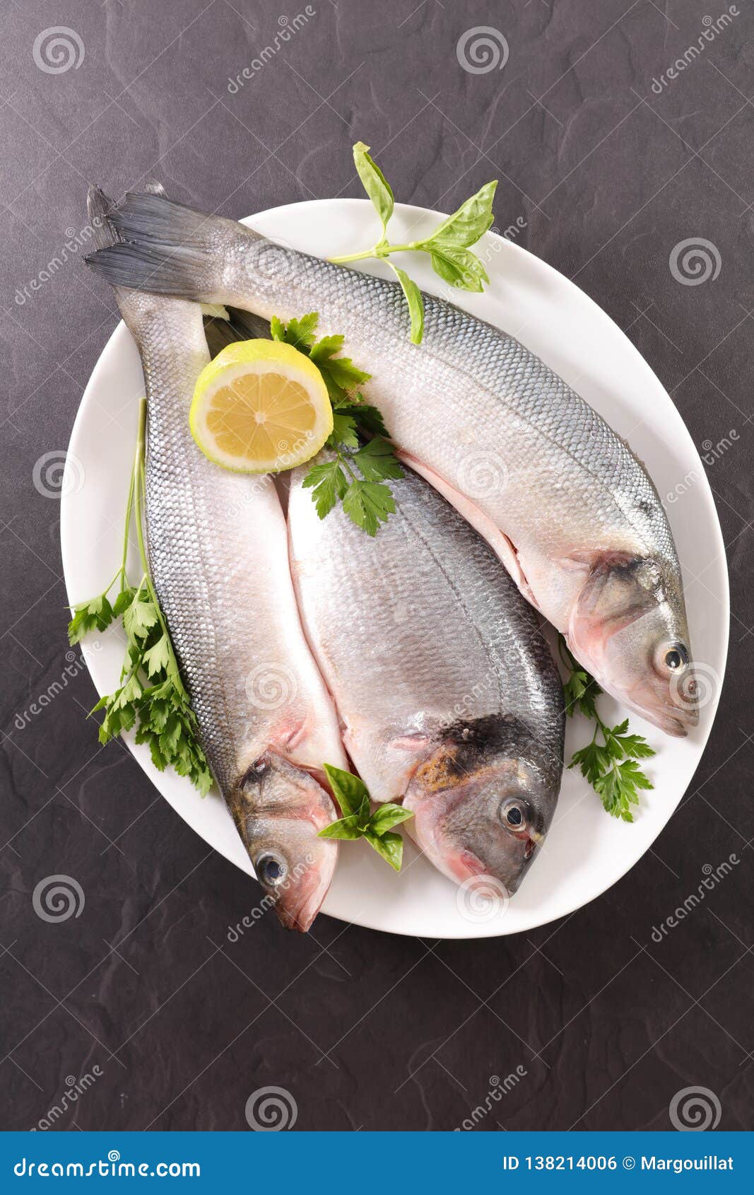 Raw fish and lemon stock photo. Image of fish, culinary - 138214006