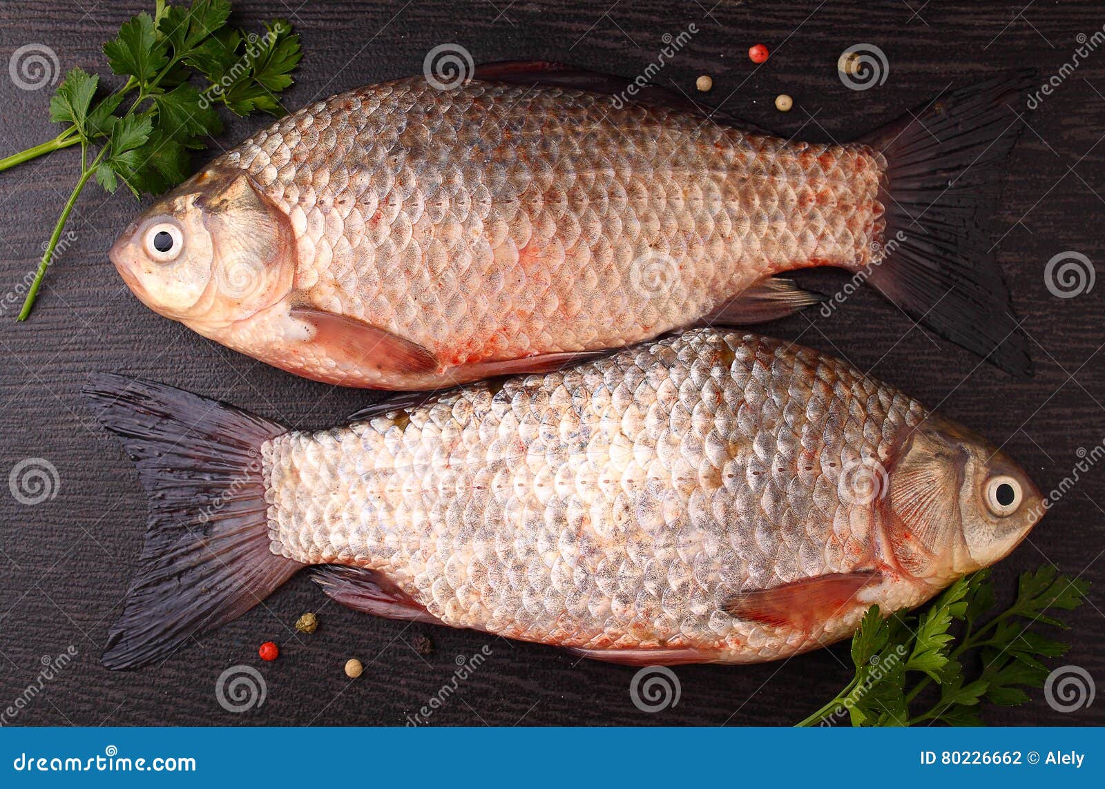 Raw fish with parsley stock photo. Image of fish, view - 80226662