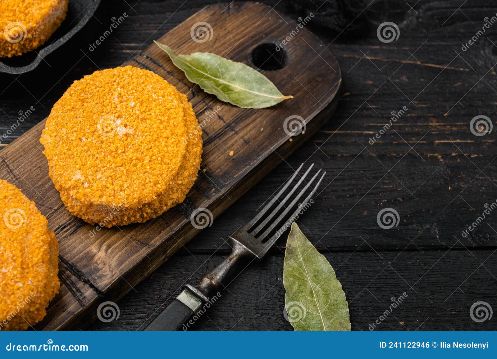 Raw Fish Patties, on Black Wooden Table Background Stock Photo - Image ...