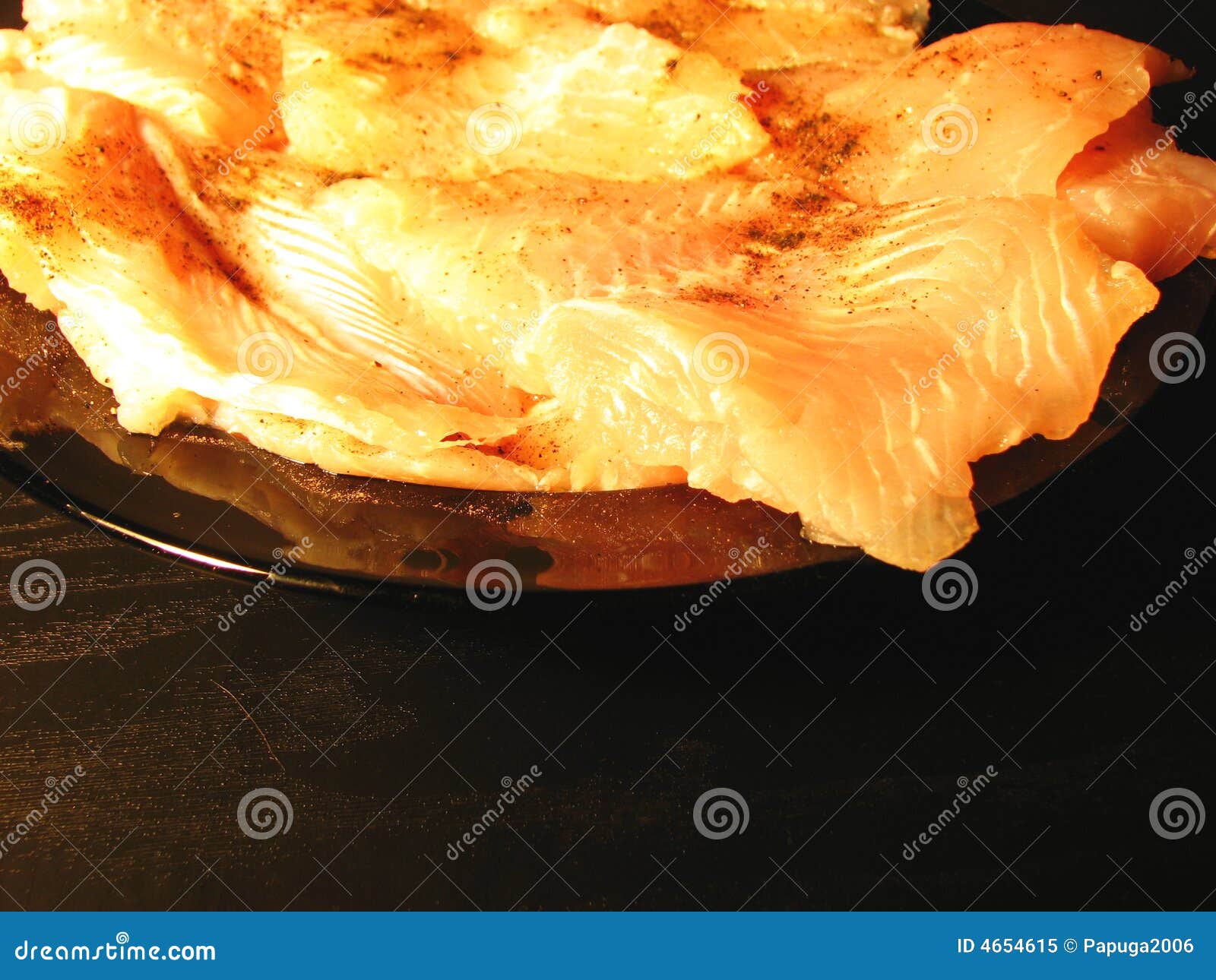 Raw fish on plate stock image. Image of detail, kitchen - 4654615