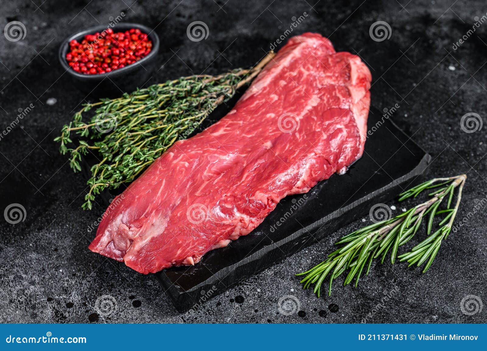 Raw Flank Beef Meat Steak. Black Background Stock Image - Image of ...