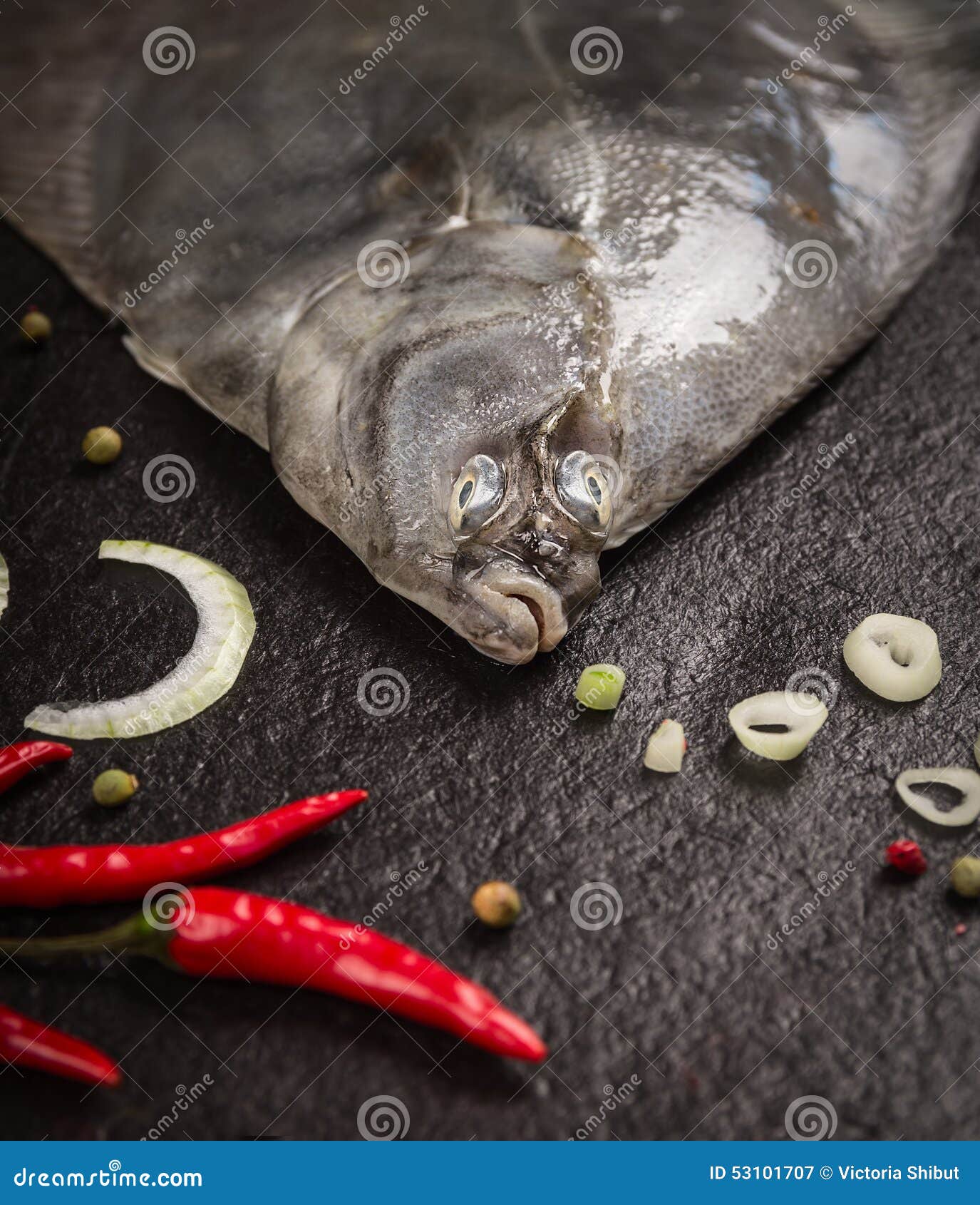 Raw Flounder Head with Spices on Dark Stone Background Stock Image ...