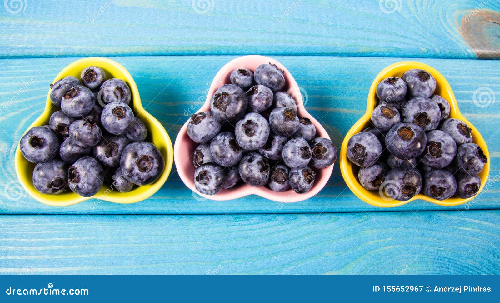 Raw Fresh Huckleberry in a Bowl. Wooden Background Stock Image - Image ...