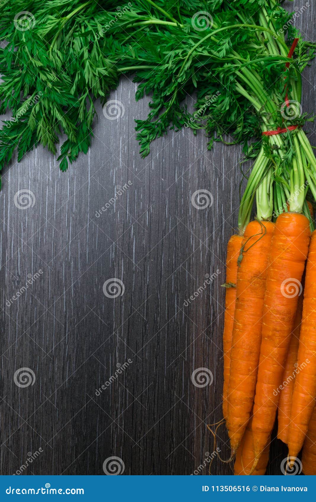Raw Organic Carrot Bunch on Black Table Stock Photo - Image of organic ...