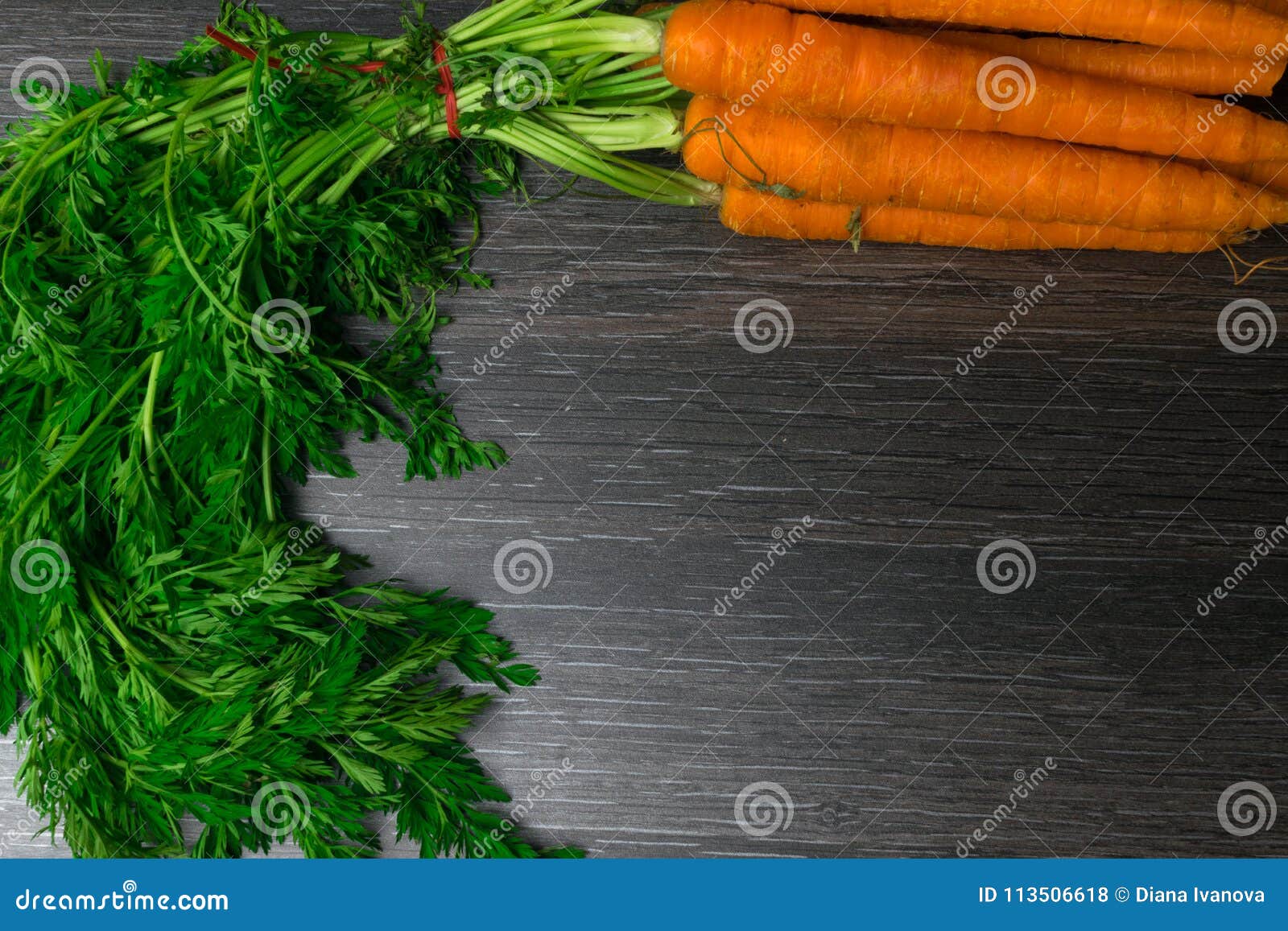 Raw Organic Carrot Bunch on Black Table Stock Photo - Image of closeup ...