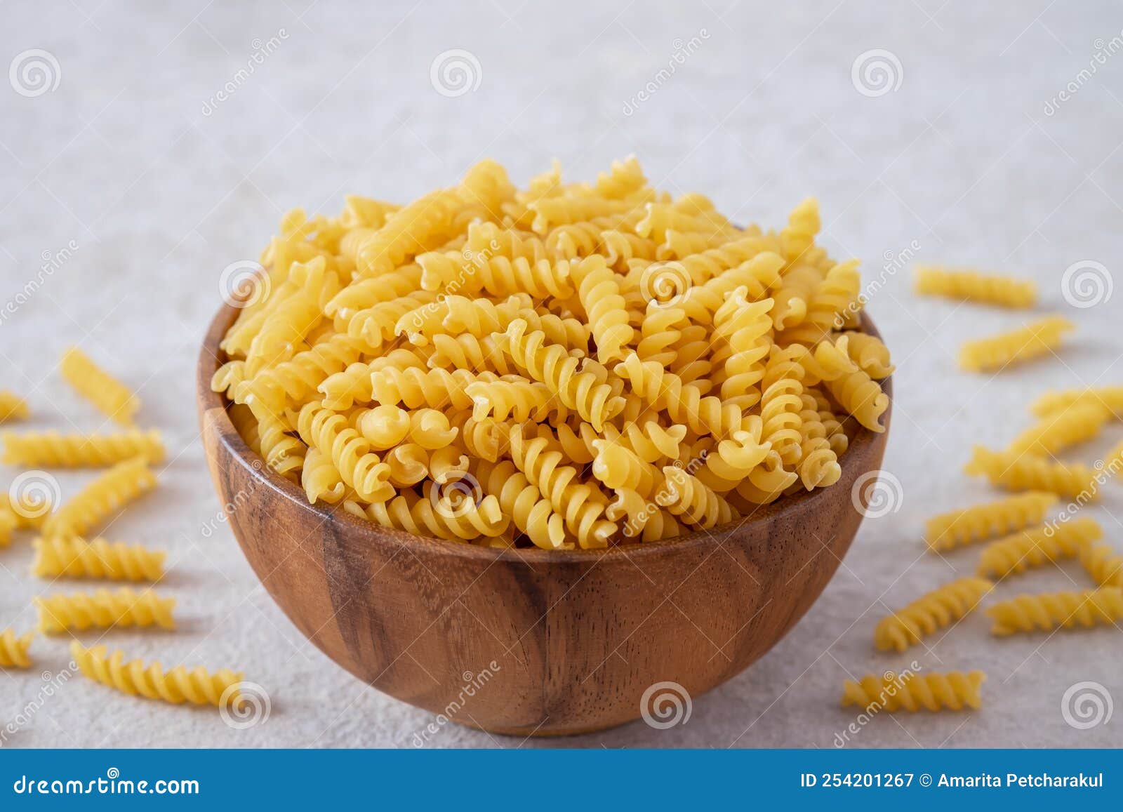 Raw Fusilli Pasta in Wooden Bowl Stock Image - Image of italian ...