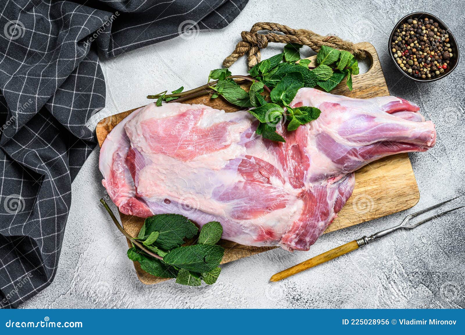 Raw Goat Shoulder Meat Ready for Baking with Garlic, Mint. White ...