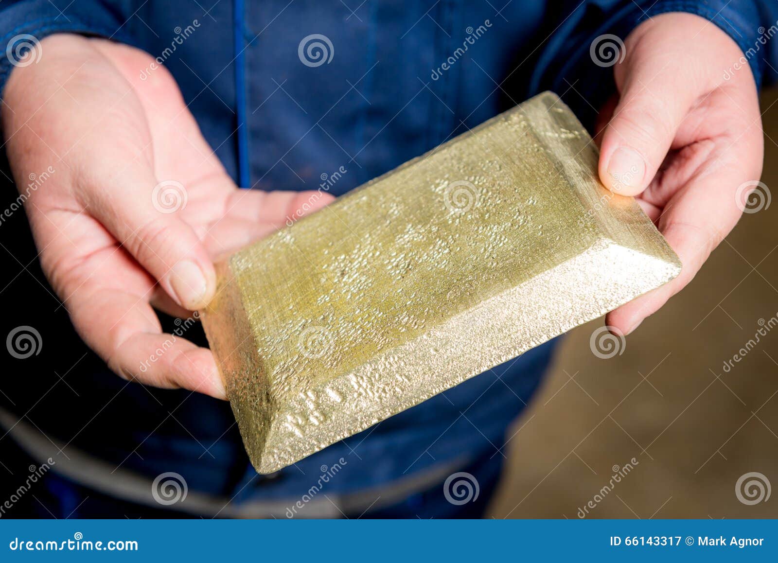 Raw Gold Ingot in the Hands Editorial Photography - Image of hold ...