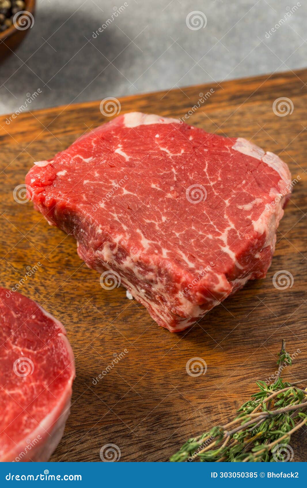 Raw Grass Fed Filet Mignon Steak Stock Image - Image of wooden, thyme ...