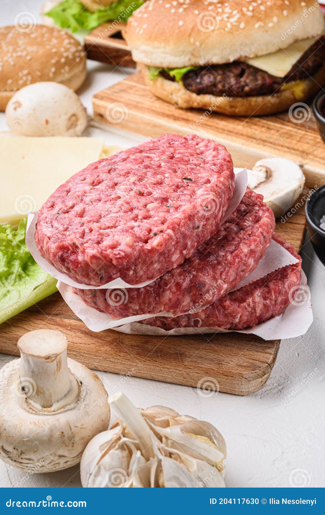 Raw Ground Beef Meat Cutlets for Burger on White Textured Background ...