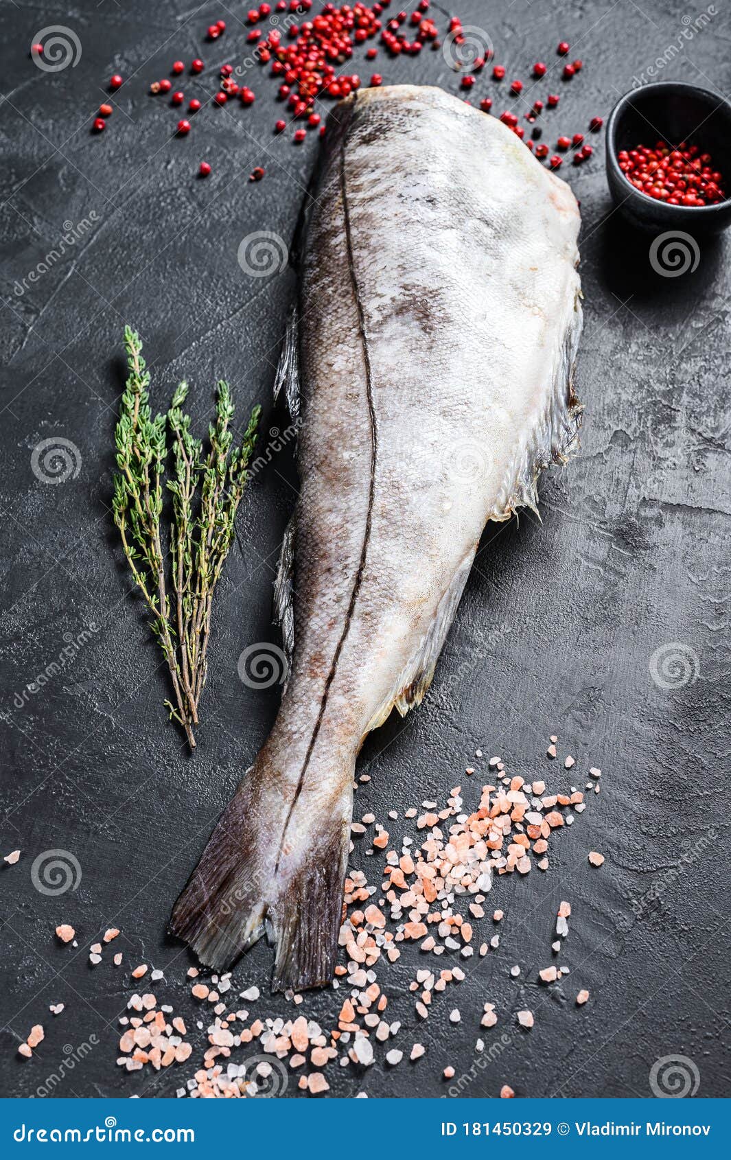 Raw Haddock Fish without a Head. Black Background Stock Image - Image ...