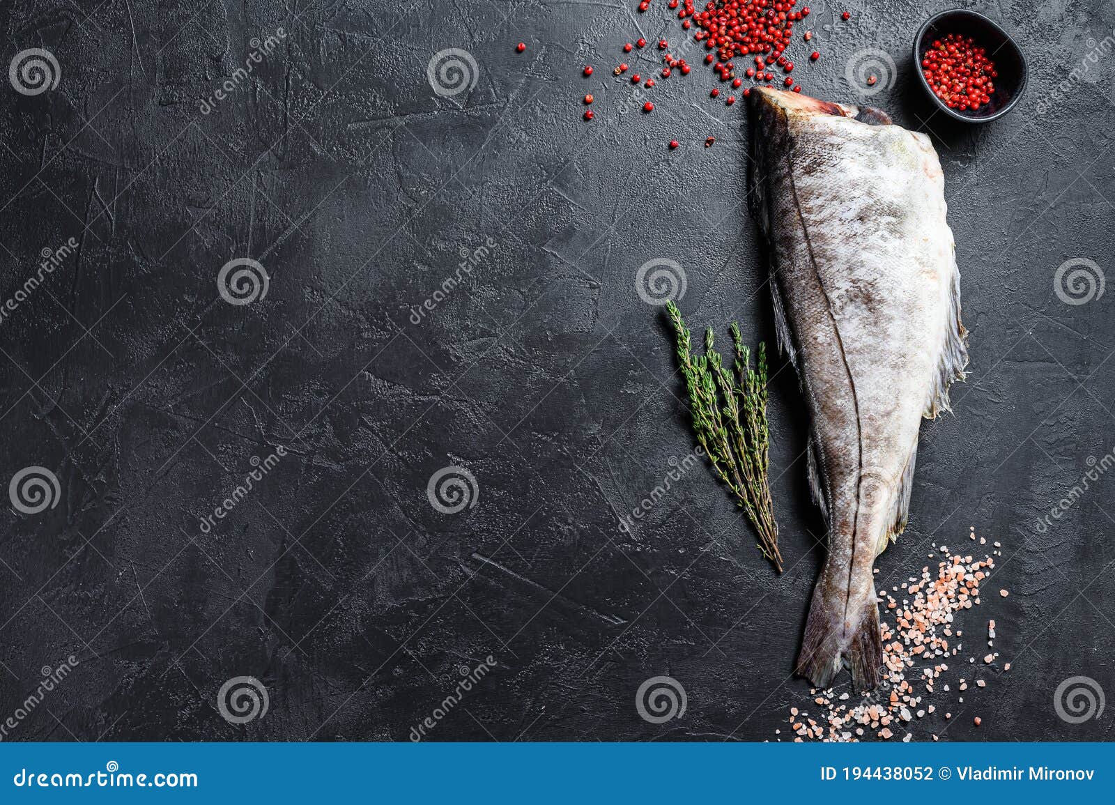 Raw Haddock Fish without a Head. Black Background. Top View Stock Photo ...