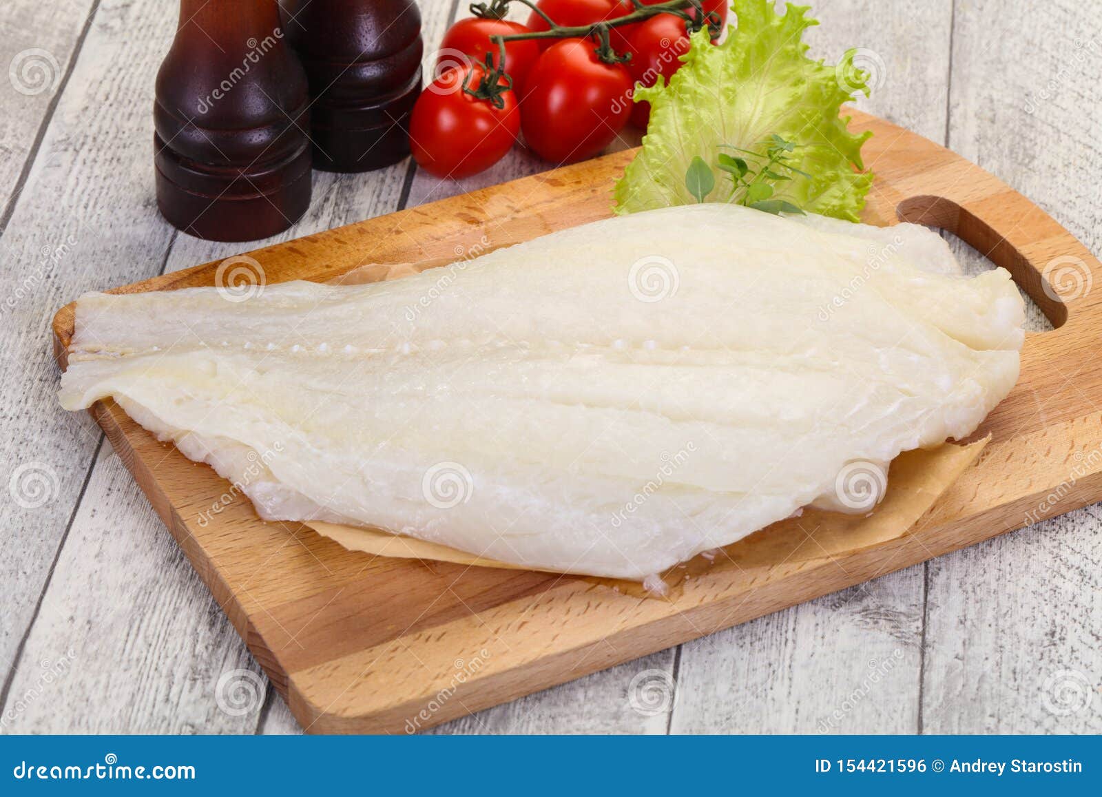 Raw halibut fillet stock photo. Image of eating, kitchen - 154421596