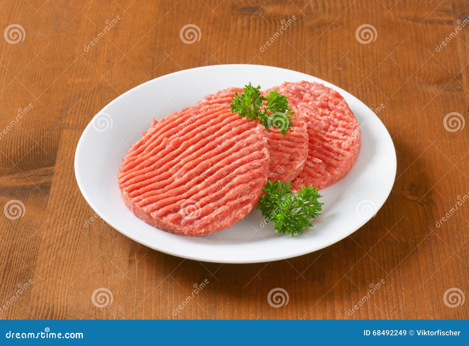 Raw hamburger patties stock image. Image of patty, wooden - 68492249