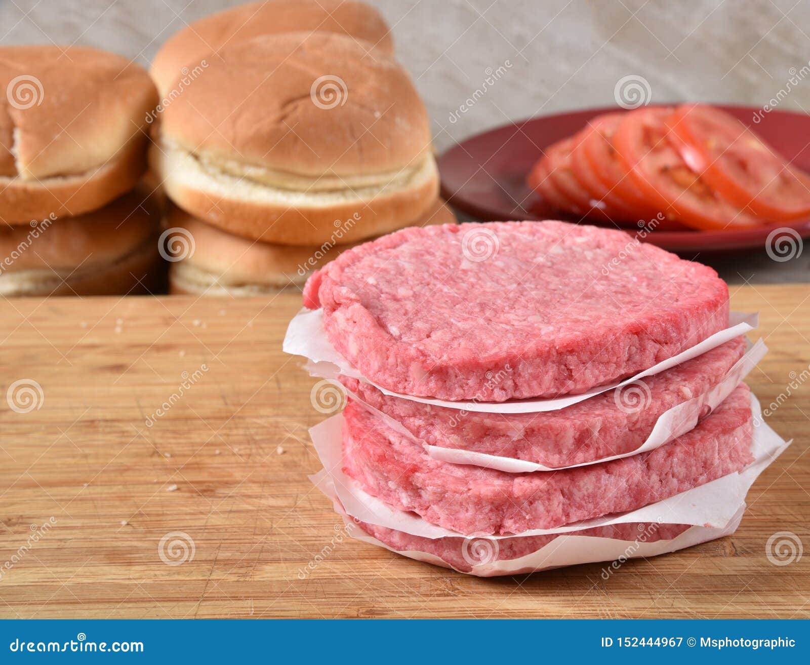 Raw hamburger patties stock image. Image of dinner, bread - 152444967