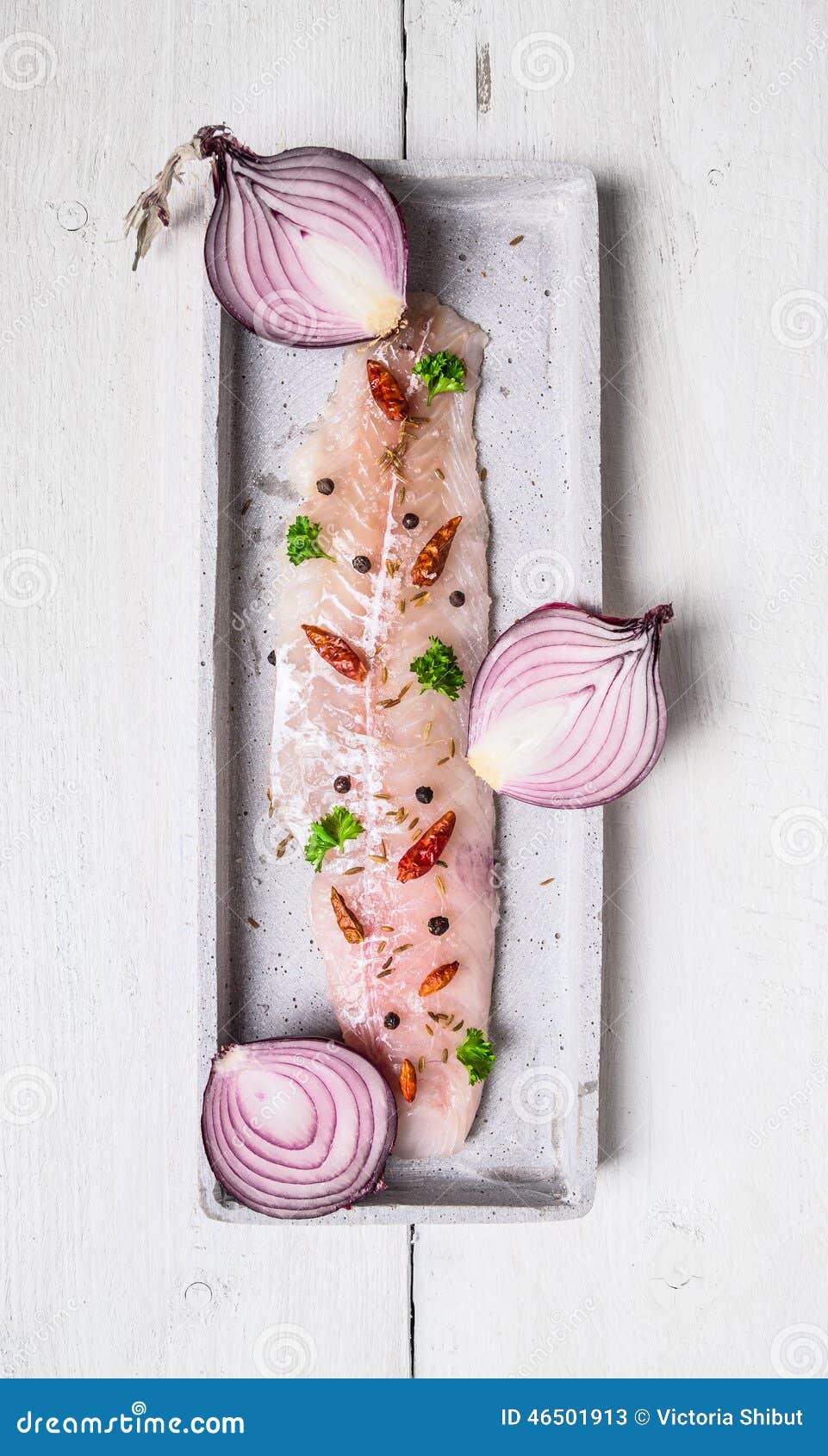 Raw Herring Fillet with Halfs Red Onion in Rectangular Plate Stock ...