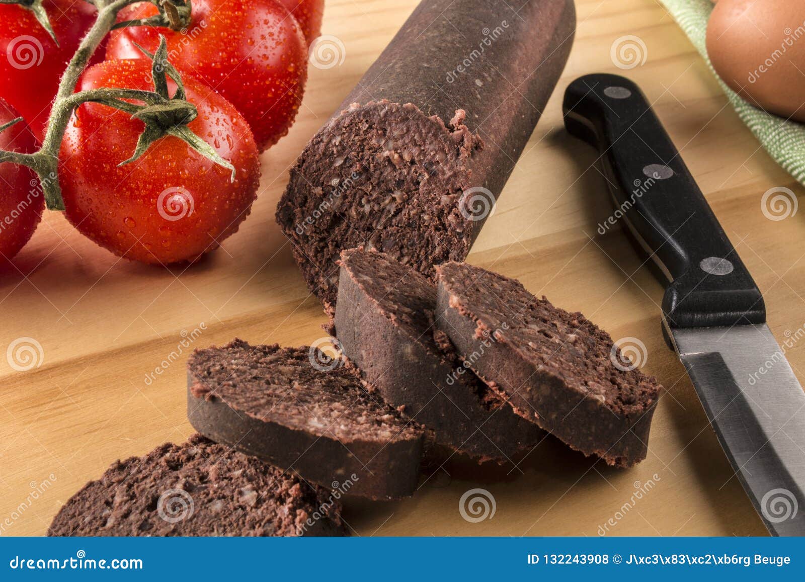 Raw Irish Black Pudding on a Wooden Board Stock Photo - Image of ...