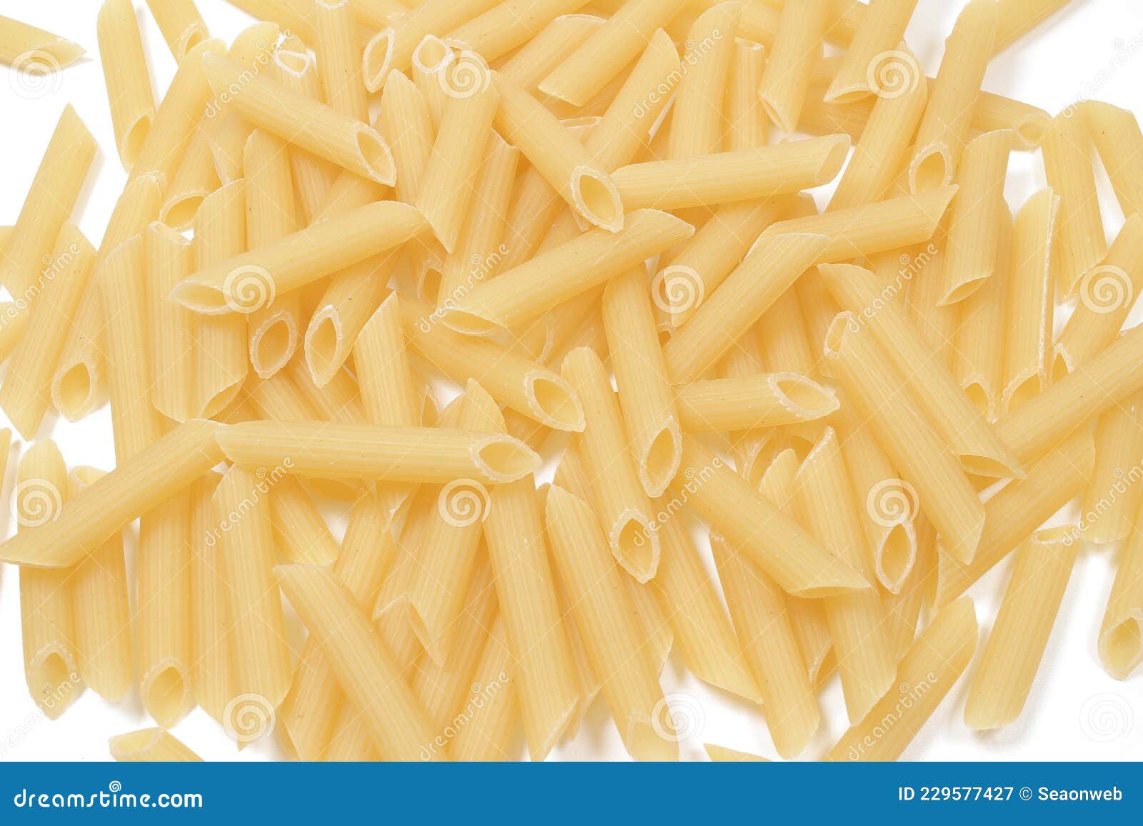 An Raw Italian Penne Rigate Pasta Isolated Stock Image - Image of ...