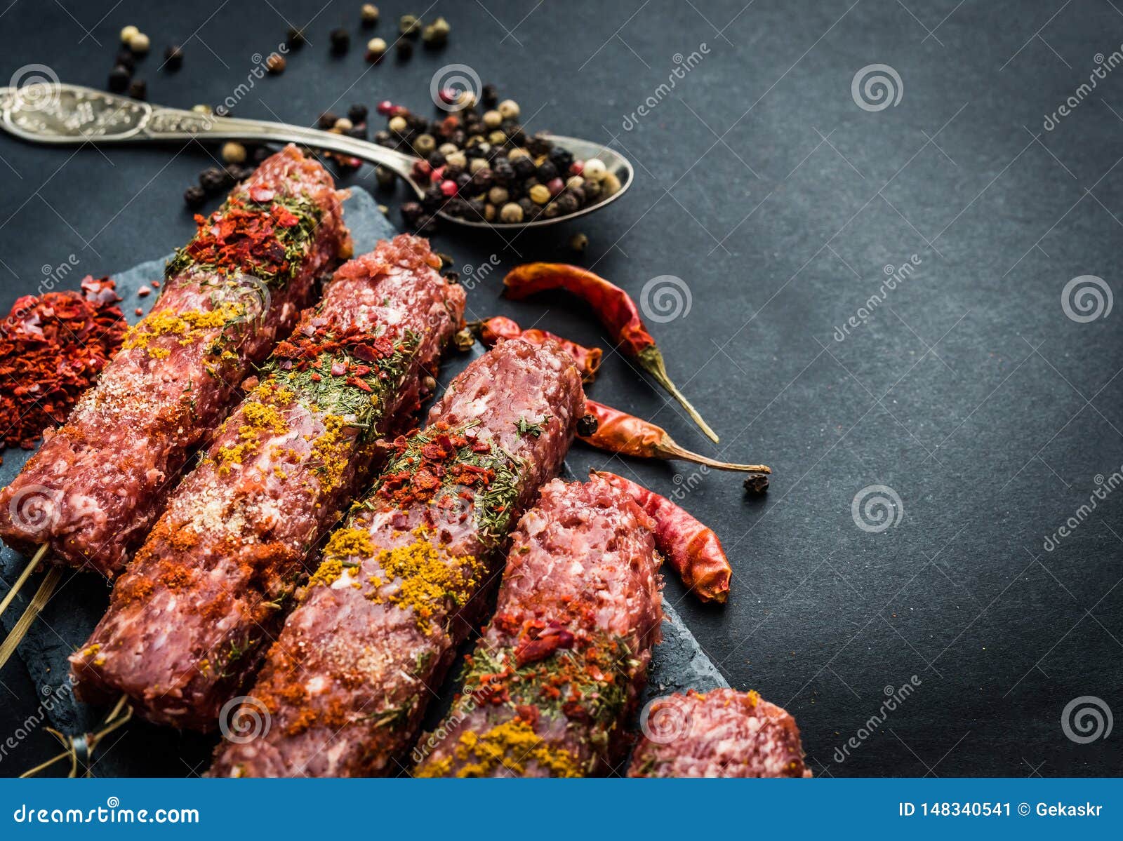 Raw kebab with spices stock image. Image of curry, cevapi - 148340541