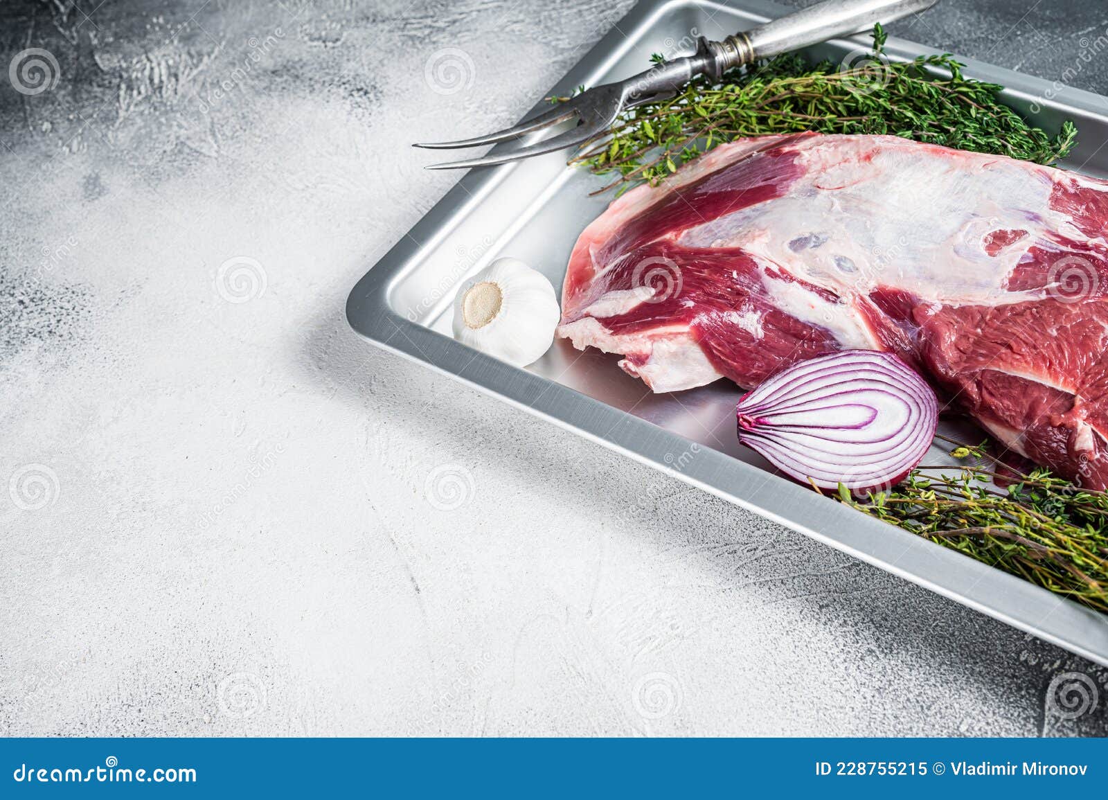 Raw Lamb Mutton Shoulder Meat in a Baking Dish with Thyme and Garlic ...