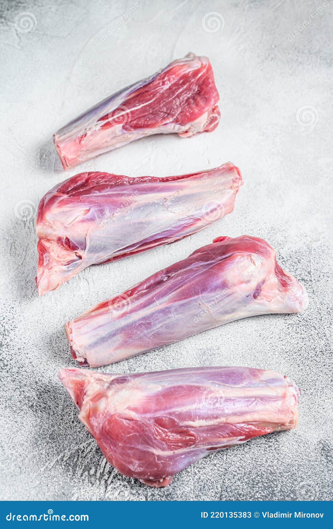 Raw Lamb Shanks Meat on Stone Table. White Background Stock Image ...